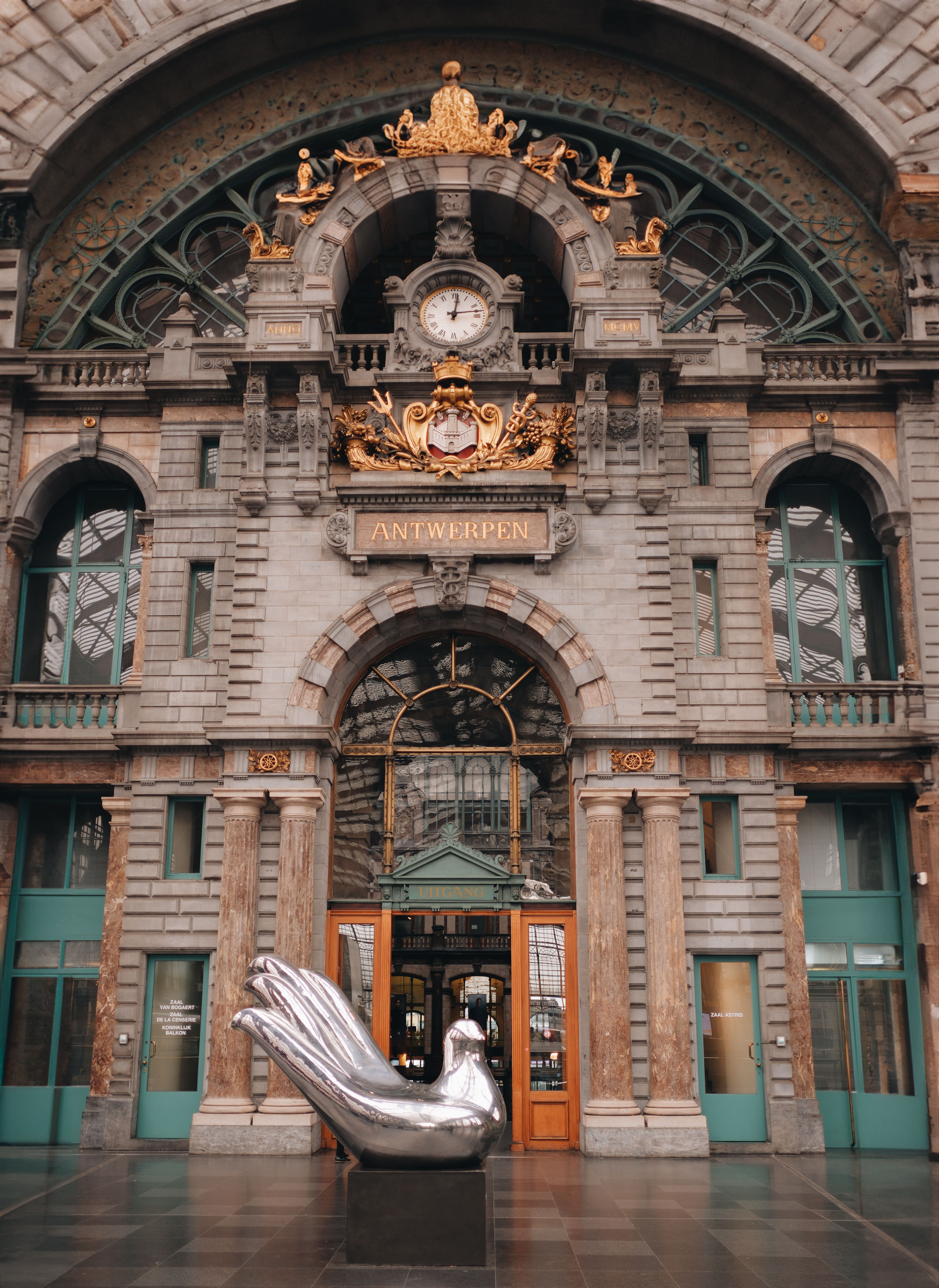 Golden Emblem on Building Facade in Antwerp · Free Stock Photo