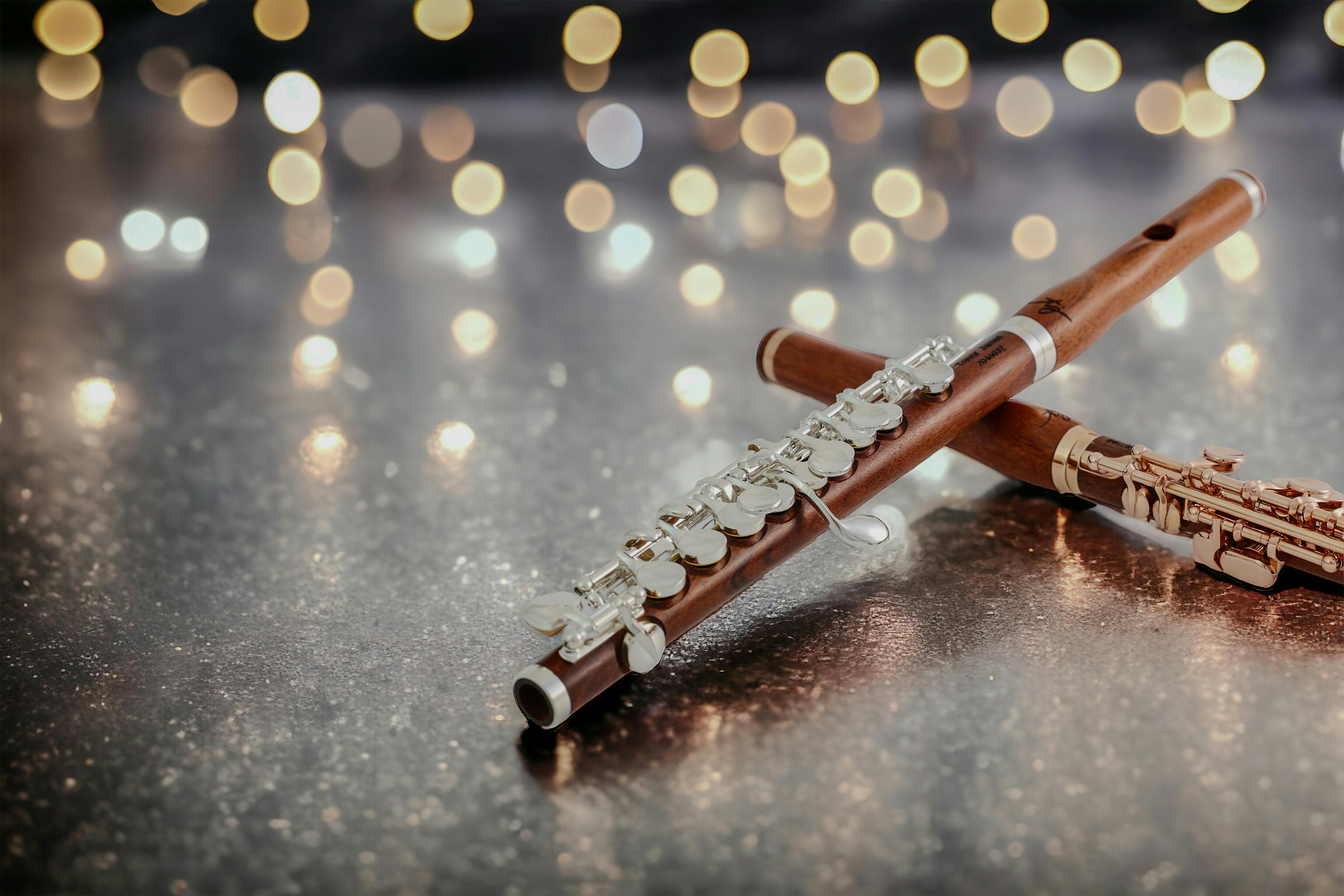 Flutes Among Lights on a Table · Free Stock Photo