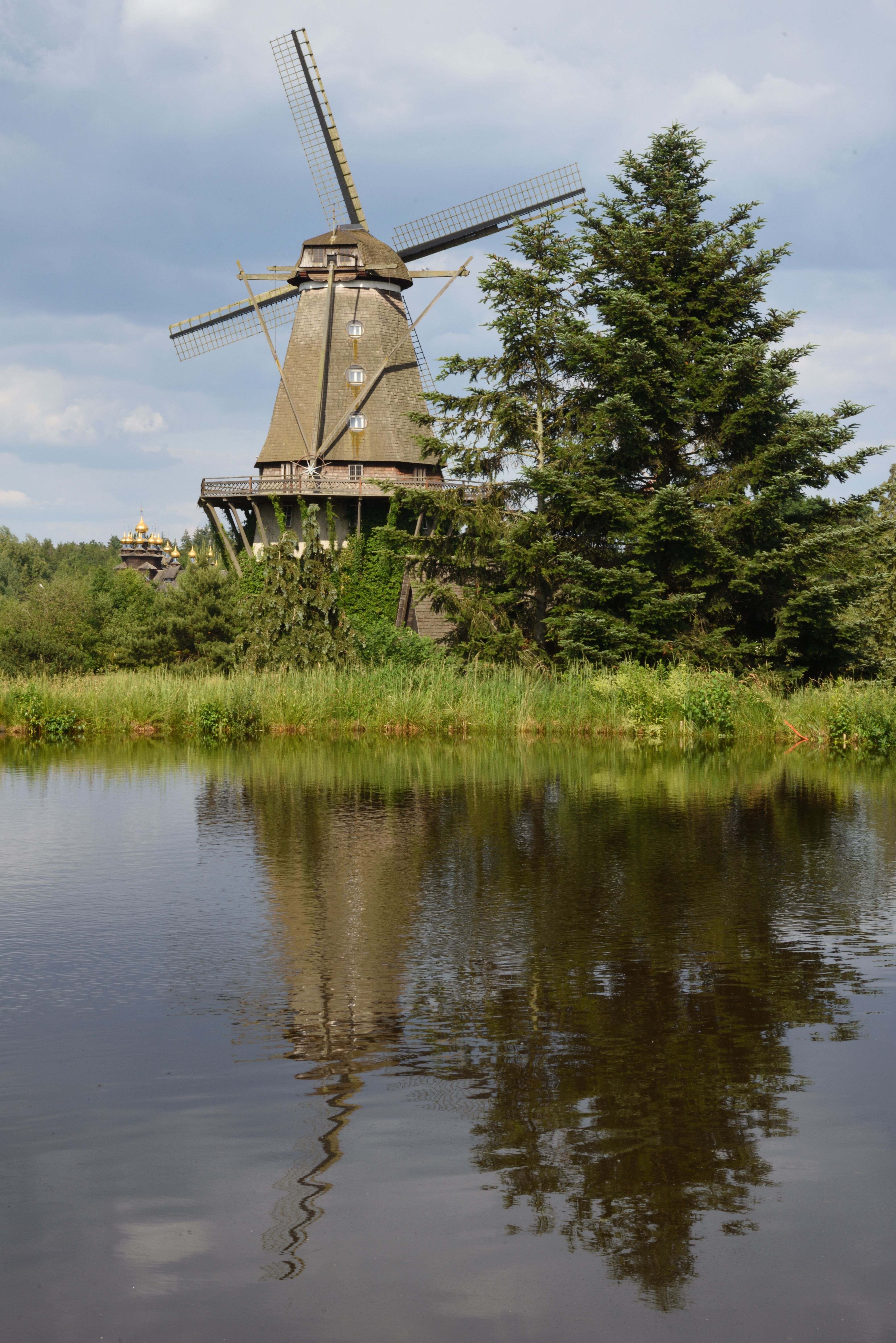 Trees and Windmill around Lake · Free Stock Photo