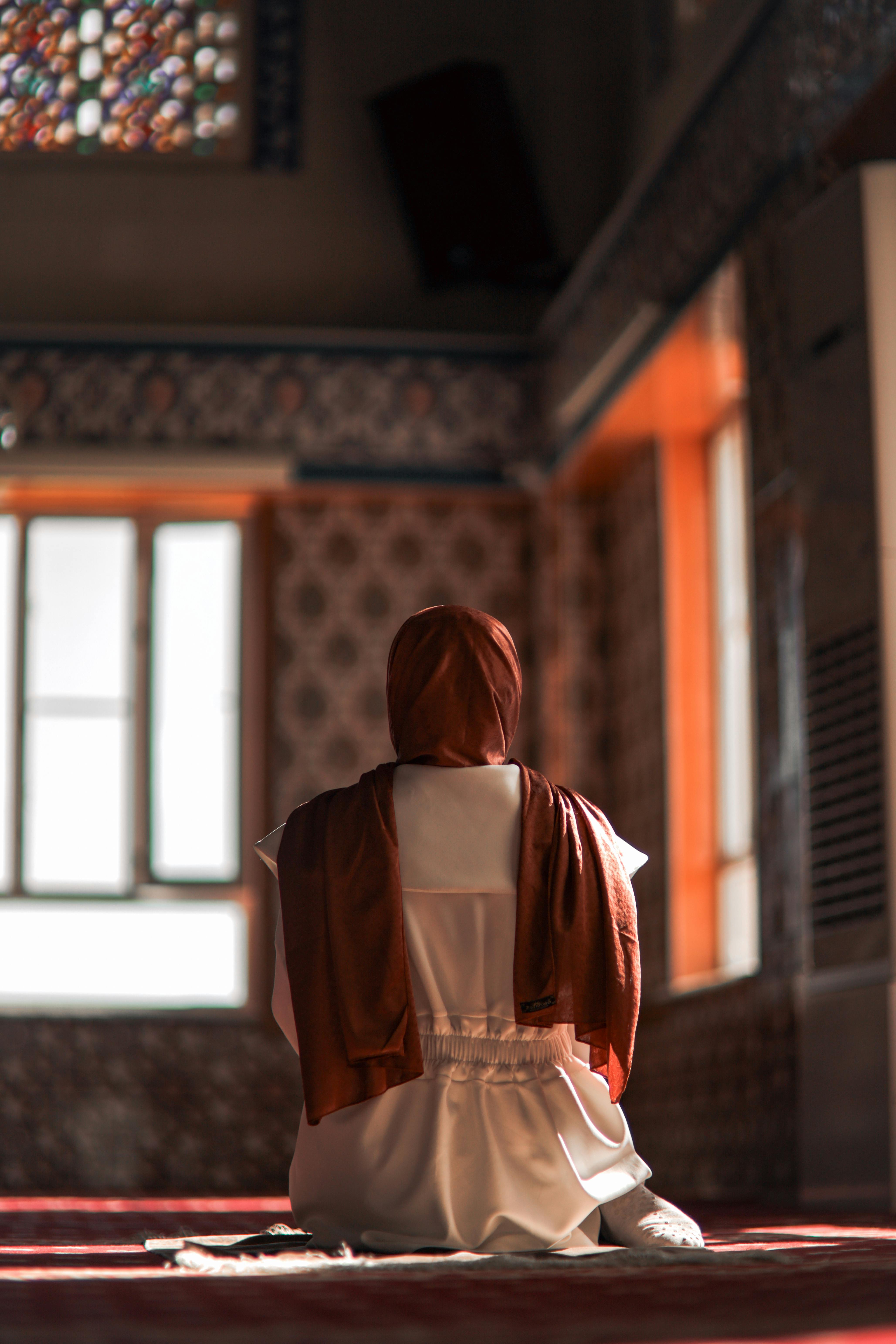 Back View of Woman Praying at Mosque · Free Stock Photo