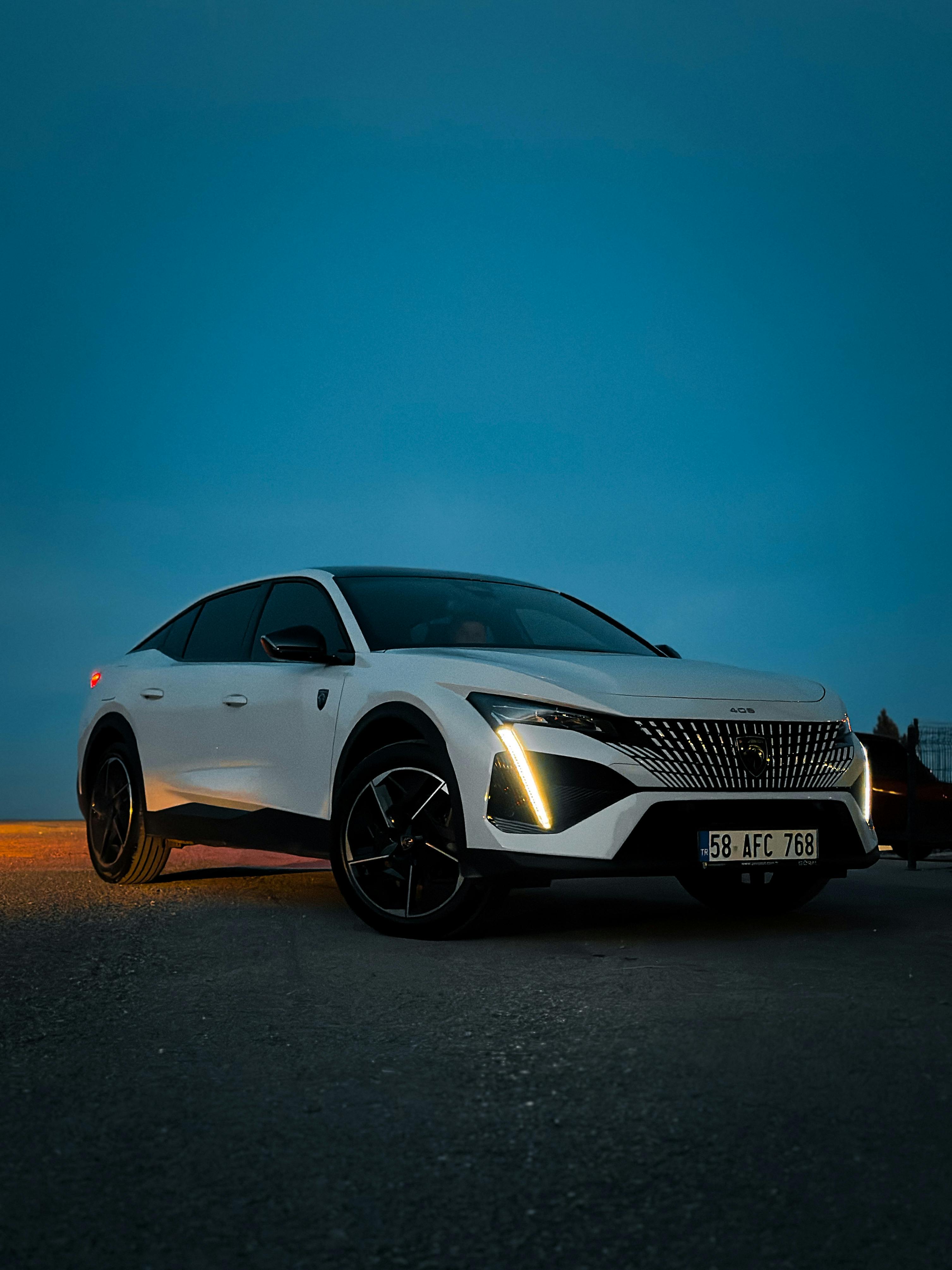 White Peugeot 408 · Free Stock Photo