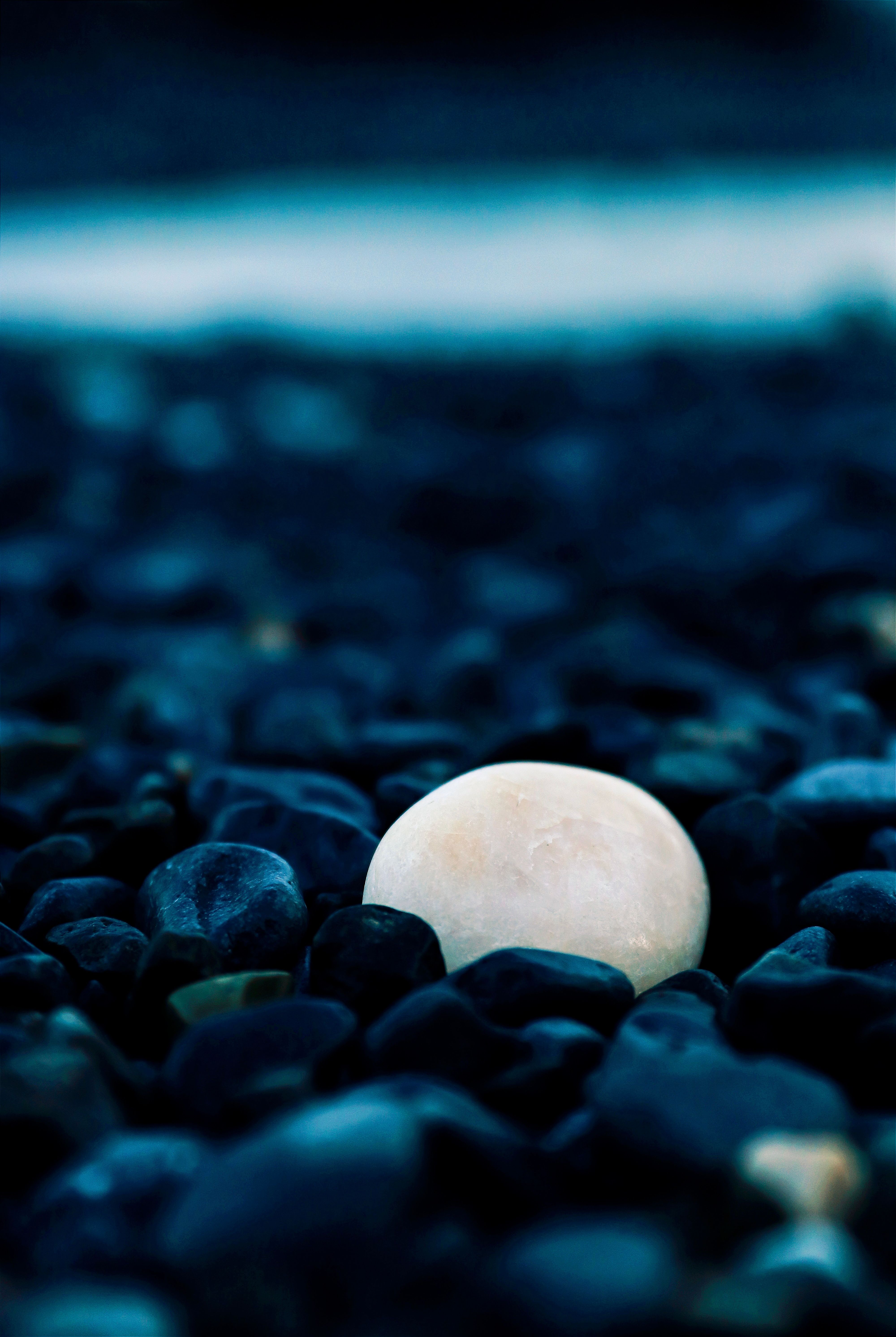White Stone among Pebbles · Free Stock Photo