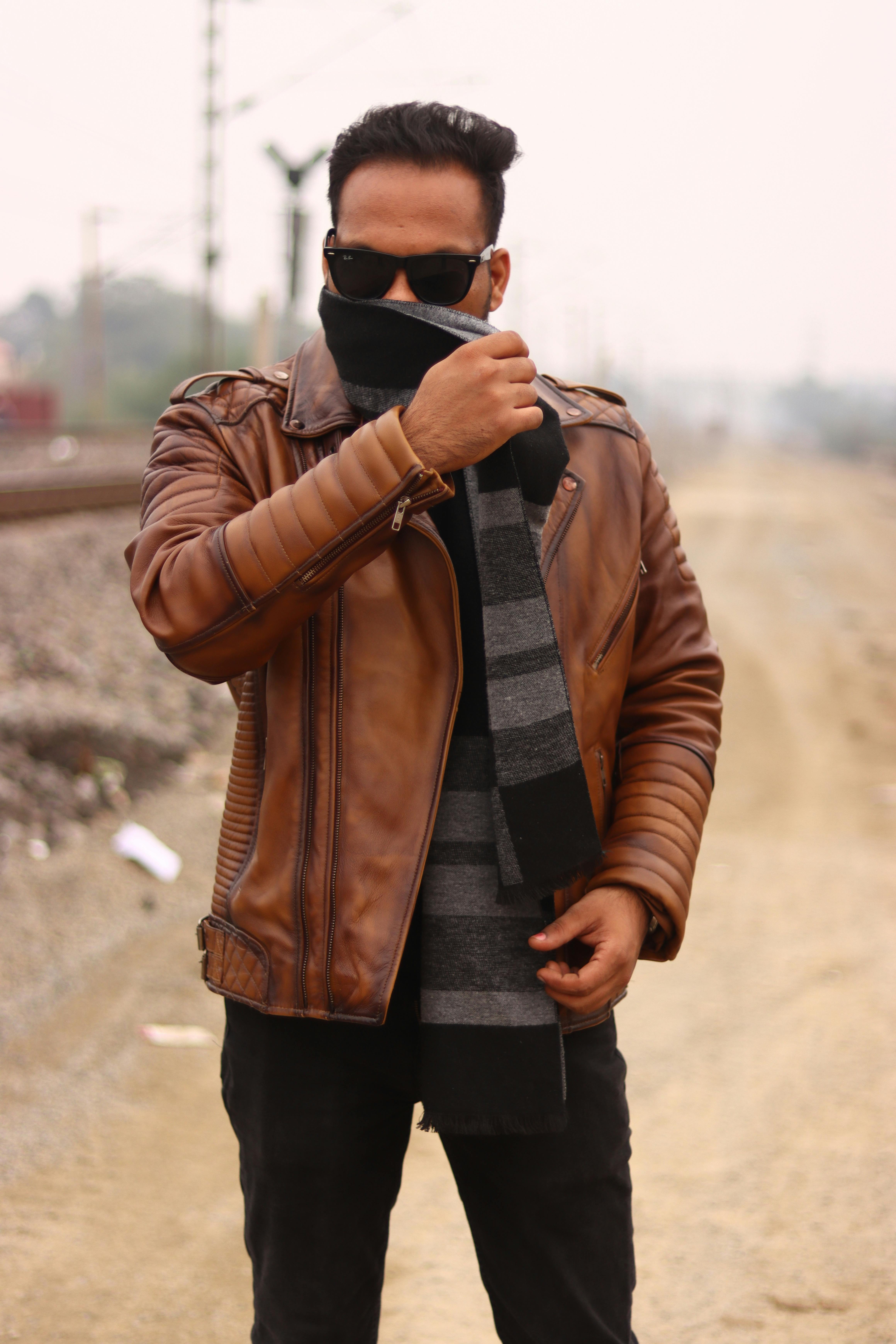 Man in Leather Jacket Covering Face with Scarf · Free Stock Photo