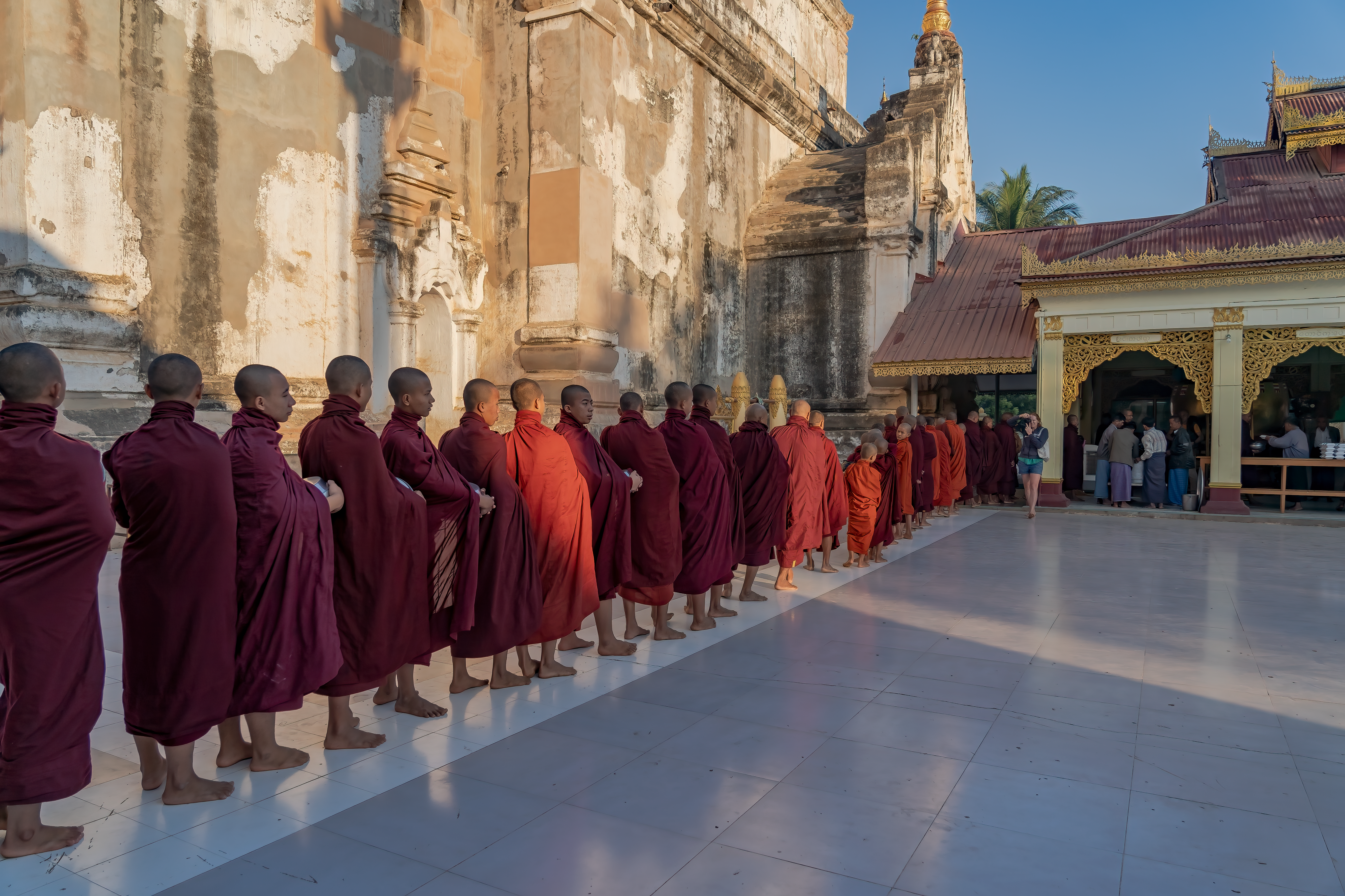 Boys in Monks Robes Standing in Row on Temple Courtyard · Free Stock Photo