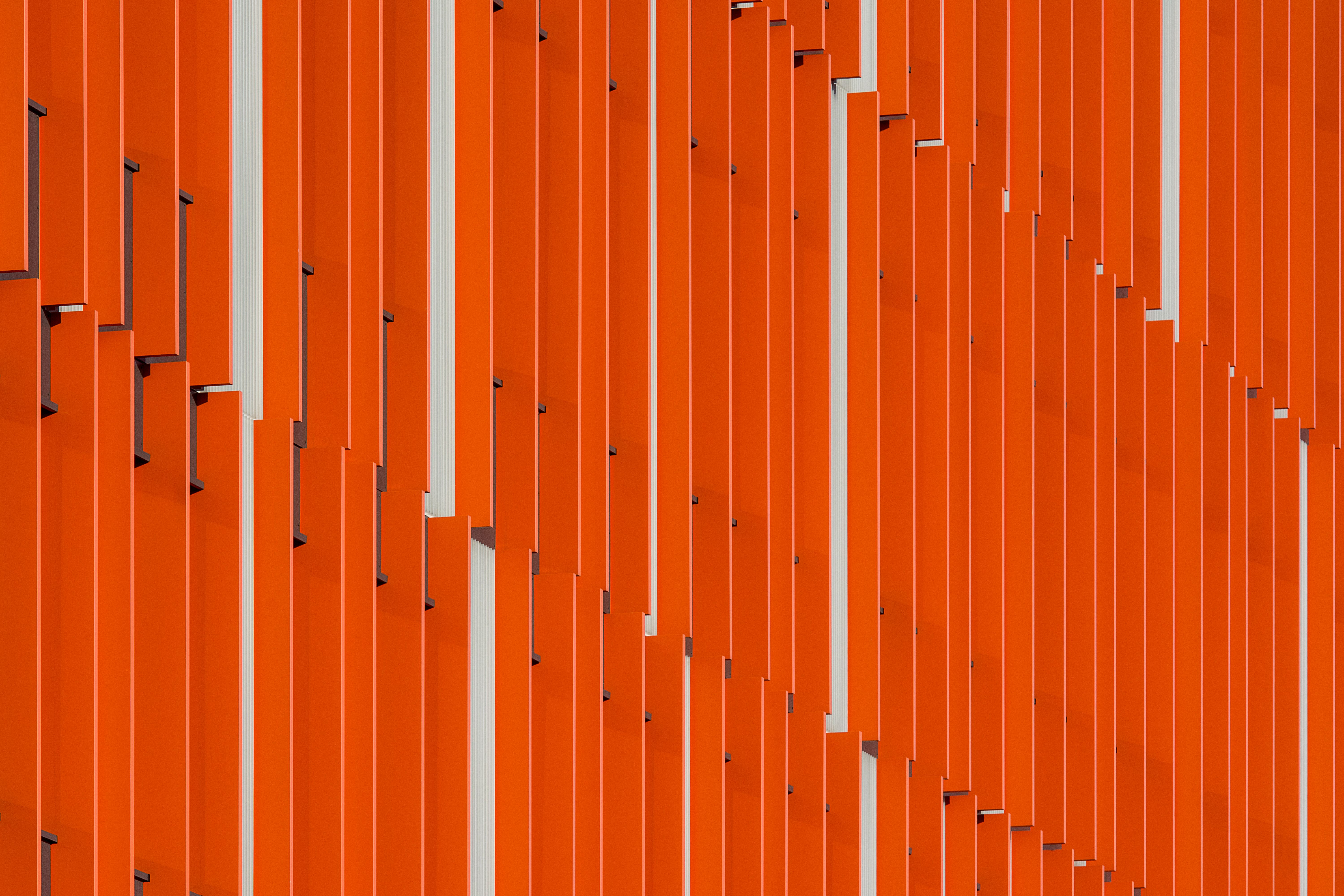 Close-up of a Building with a Bright Orange Facade · Free Stock Photo