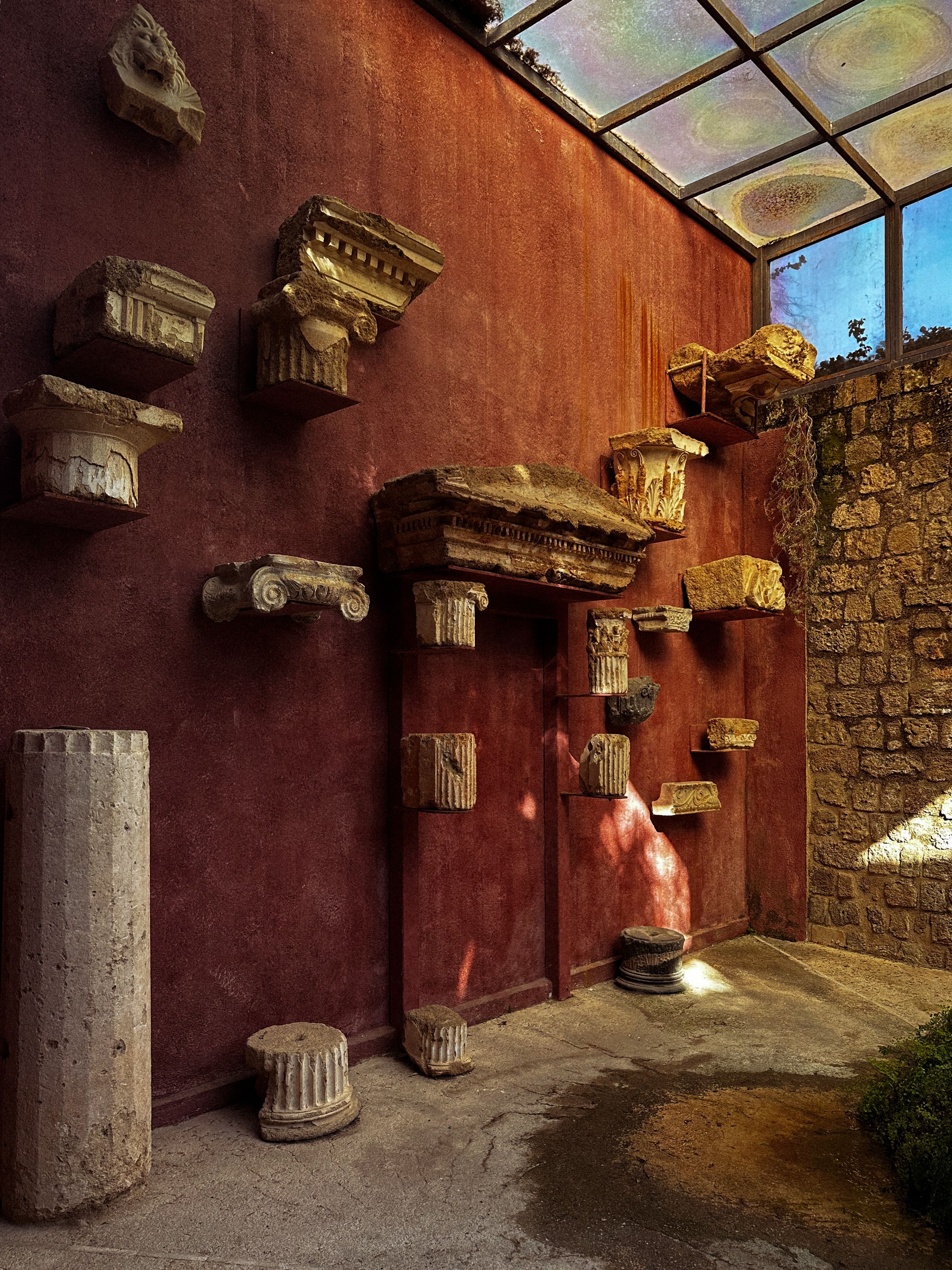 Ancient Columns on Wall in Museum · Free Stock Photo