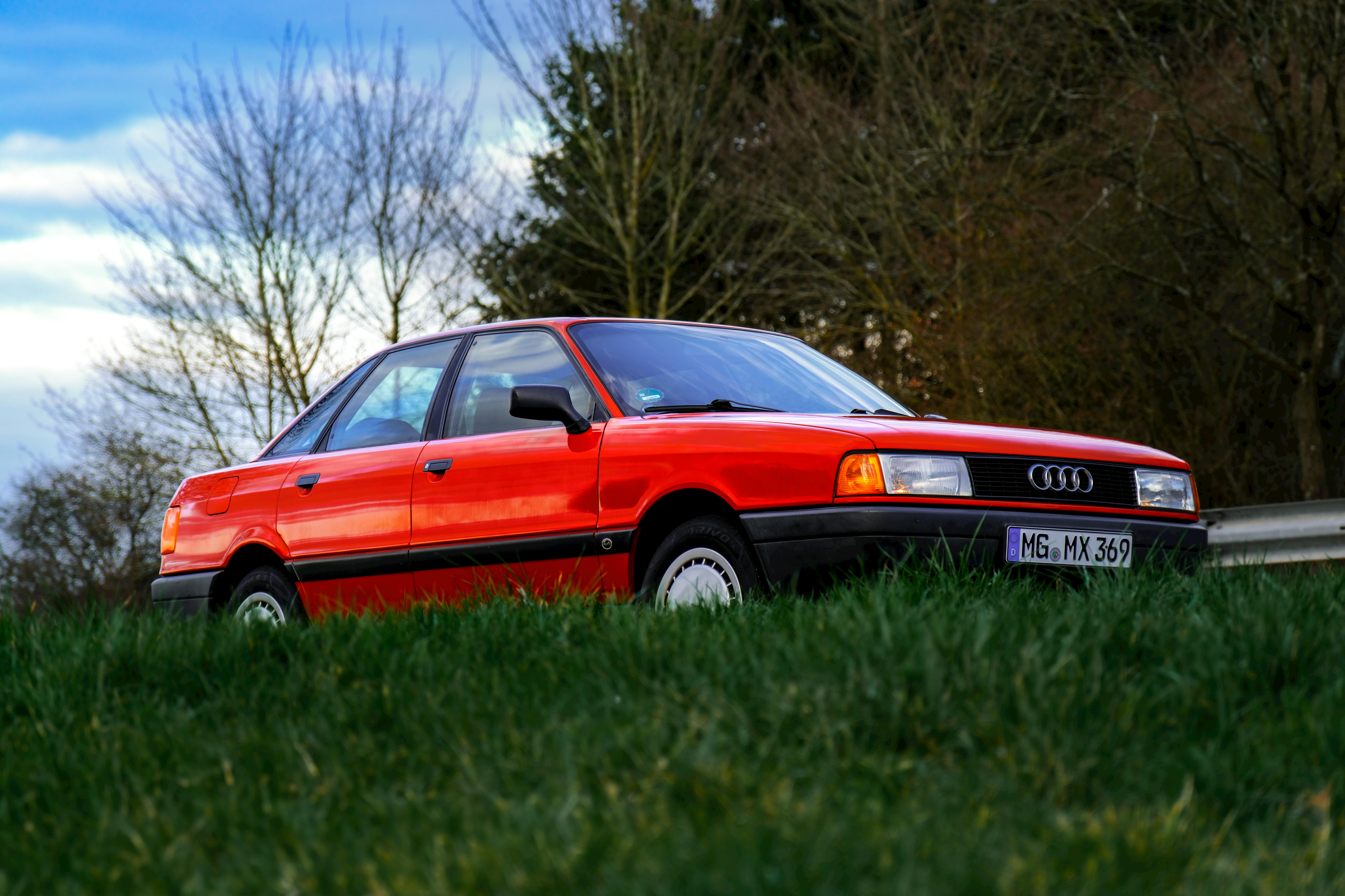 Red Audi 80 Parked in the Nature · Free Stock Photo