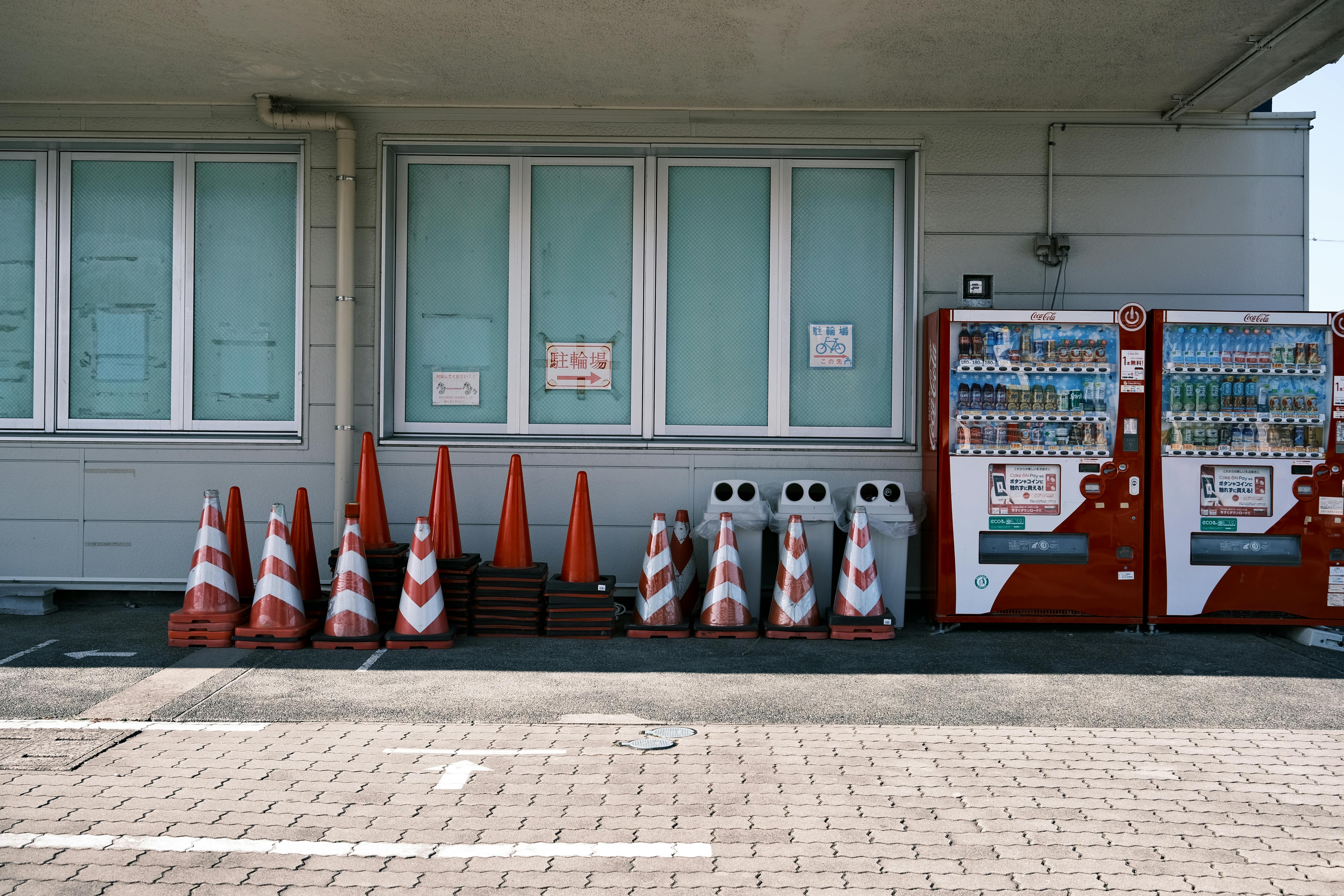 View of Vending Machines and Traffic Cones Standing Outside of a ...