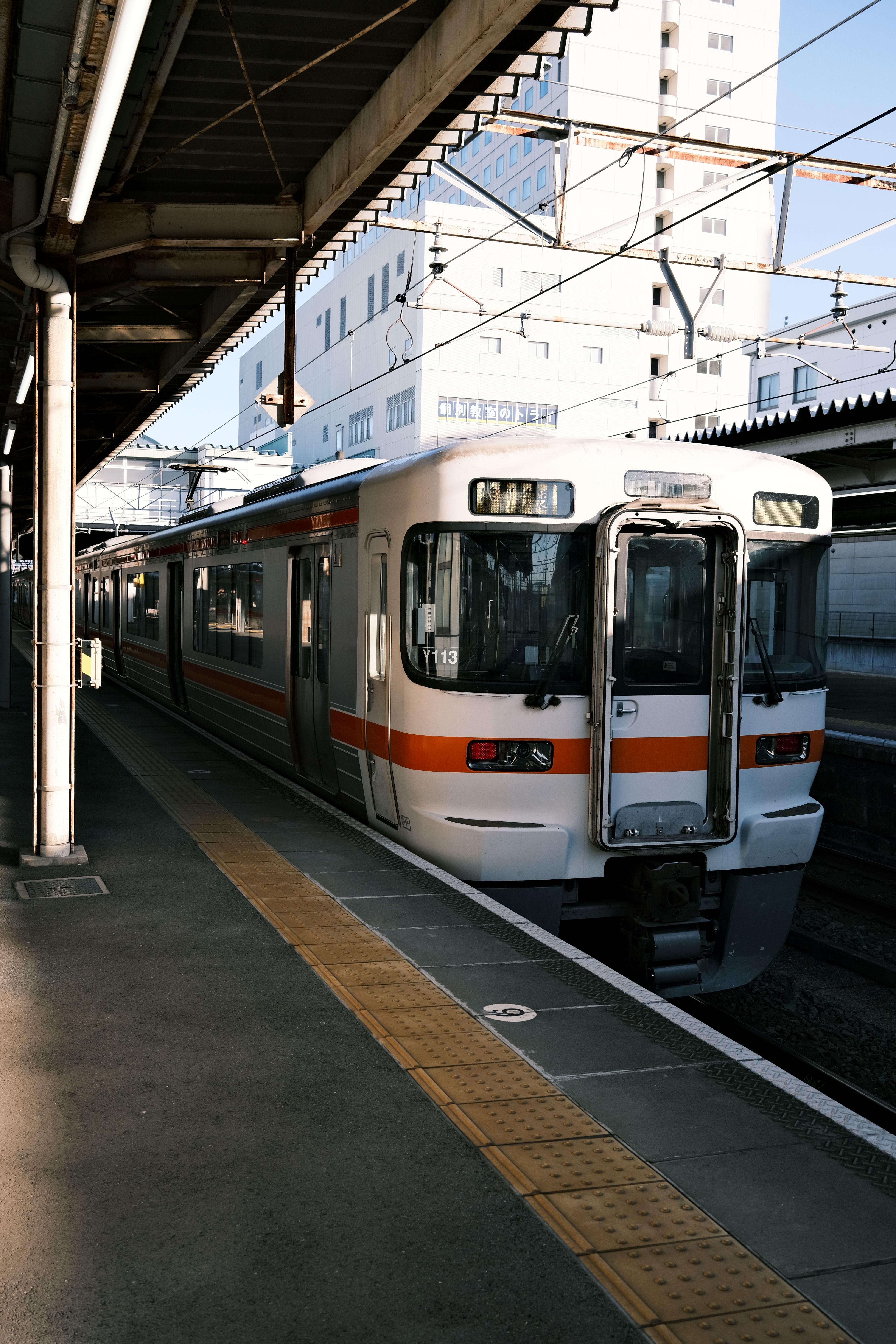 View of a Train at the Station in a Japanese City · Free Stock Photo