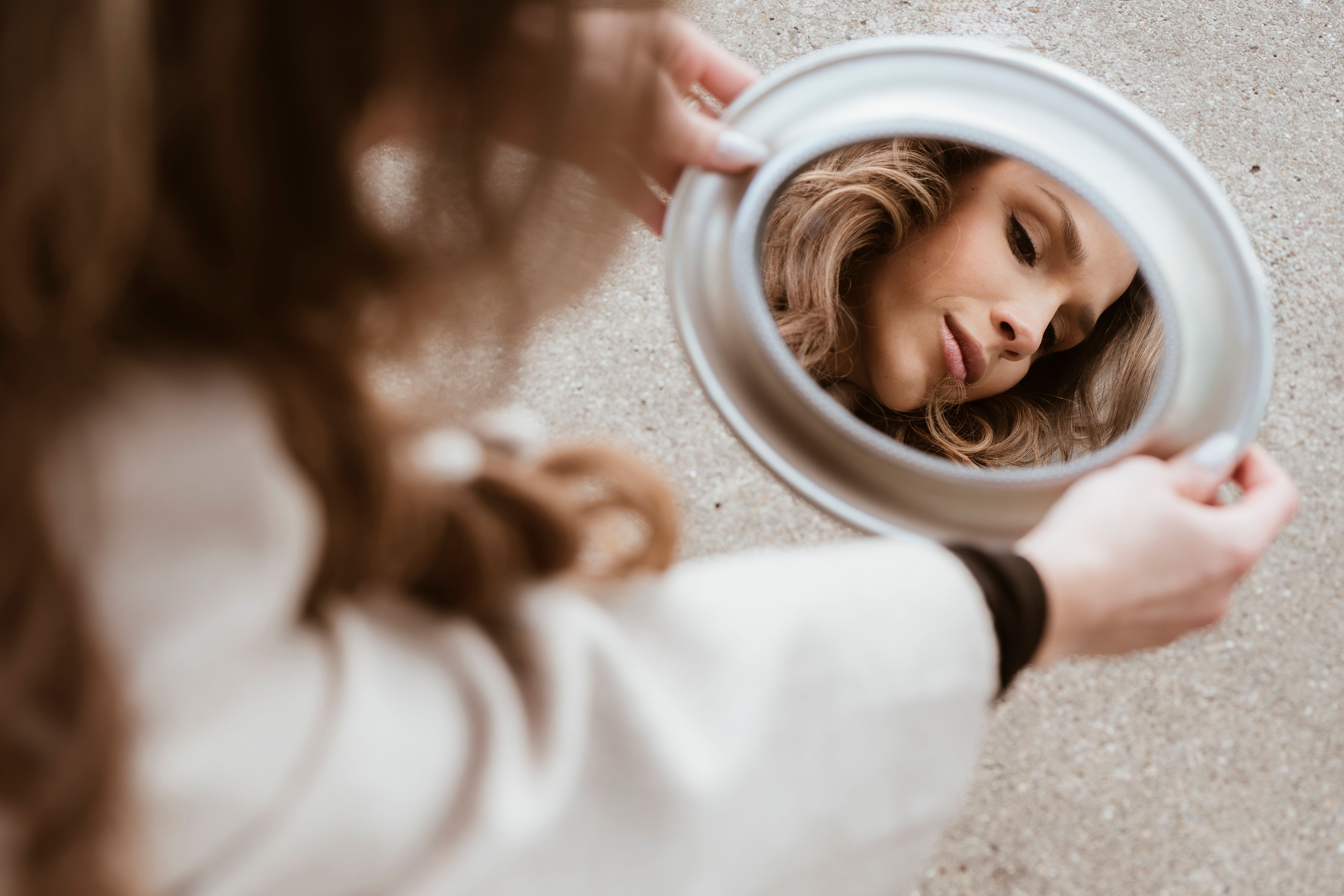 Reflection of Woman in a Mirror · Free Stock Photo