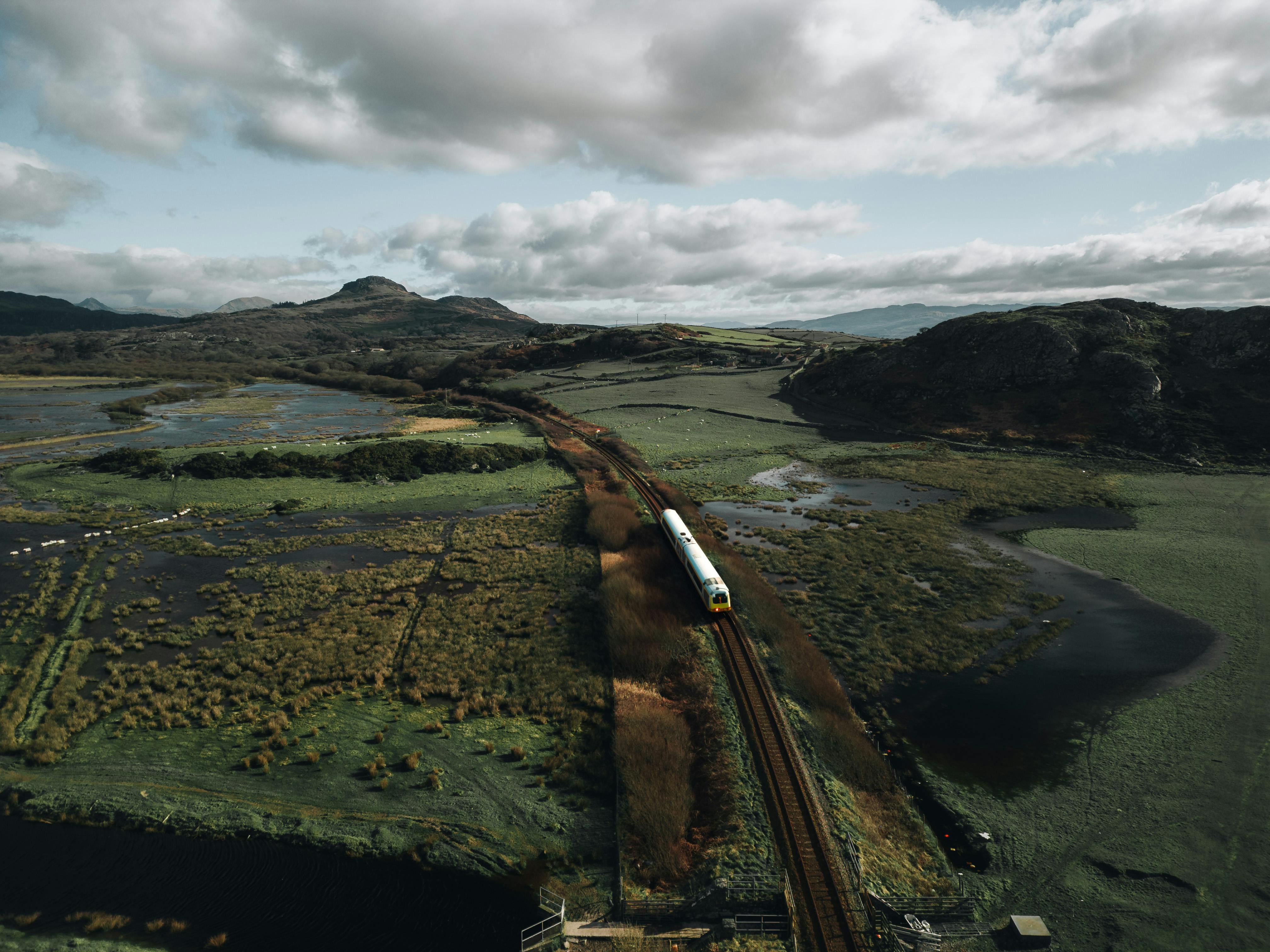 Aerial Footage of a Railway Track in Wetland · Free Stock Photo