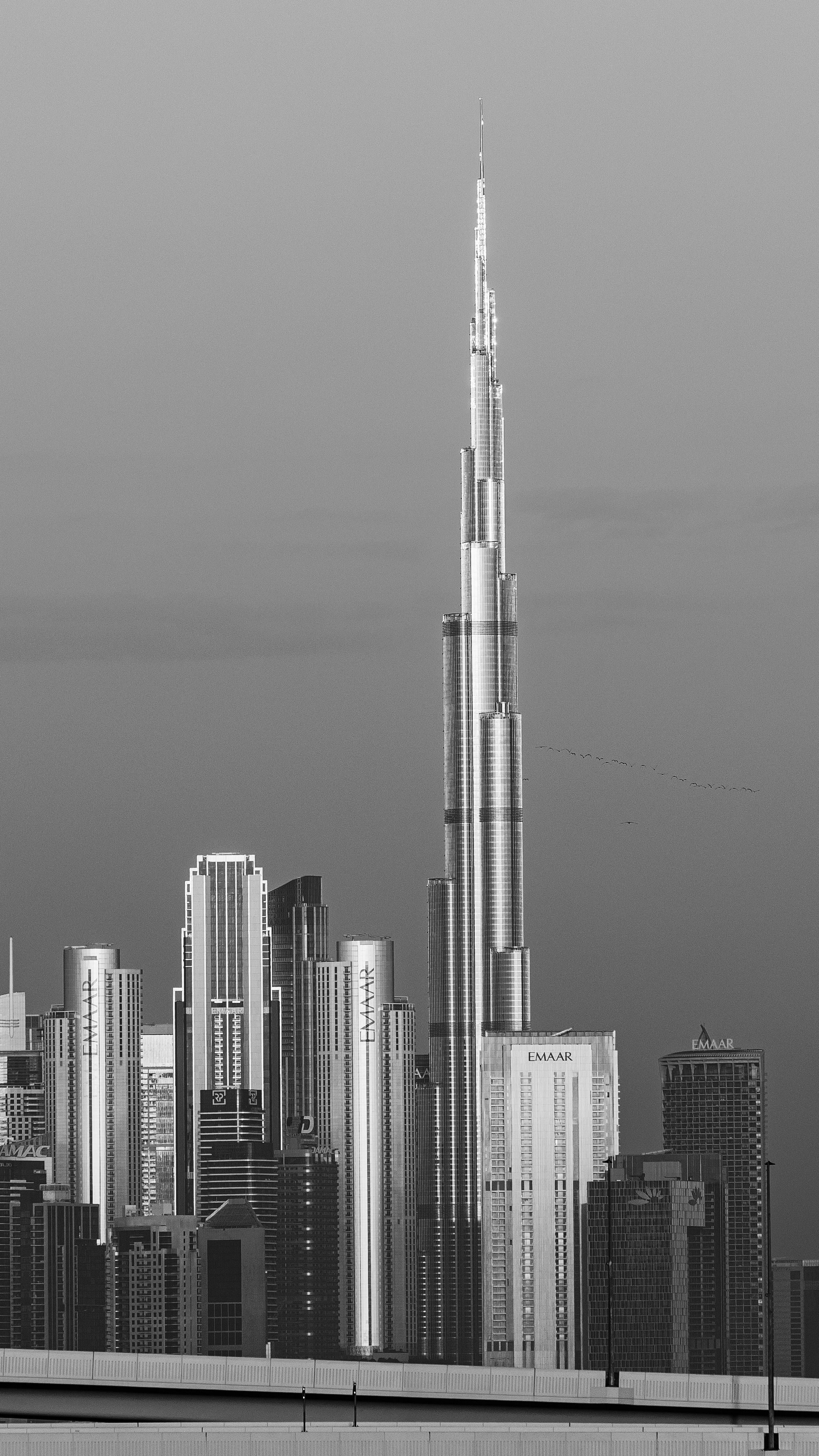 Black and white photo of the burj tower · Free Stock Photo