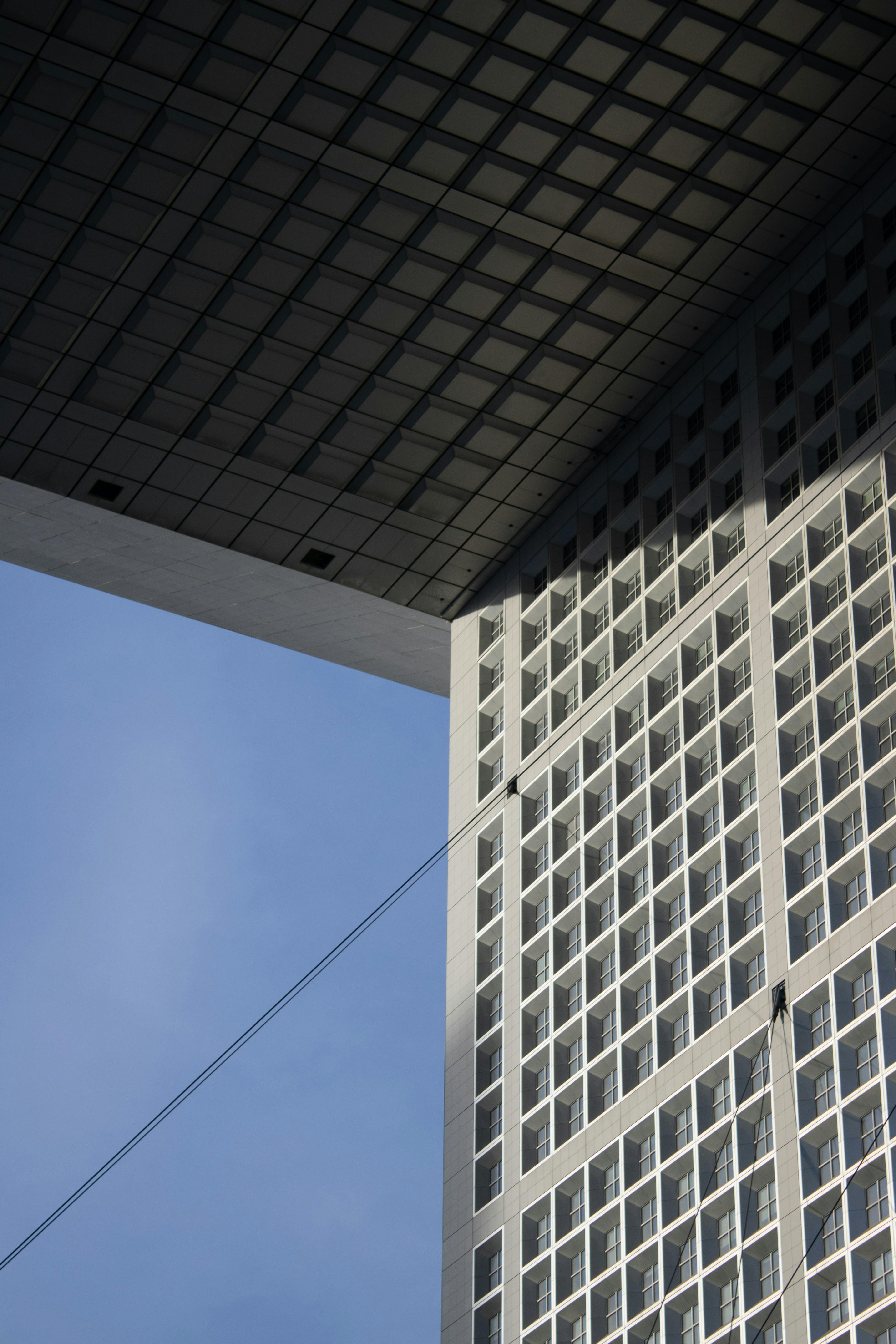 Gray Concrete High-rise Building · Free Stock Photo