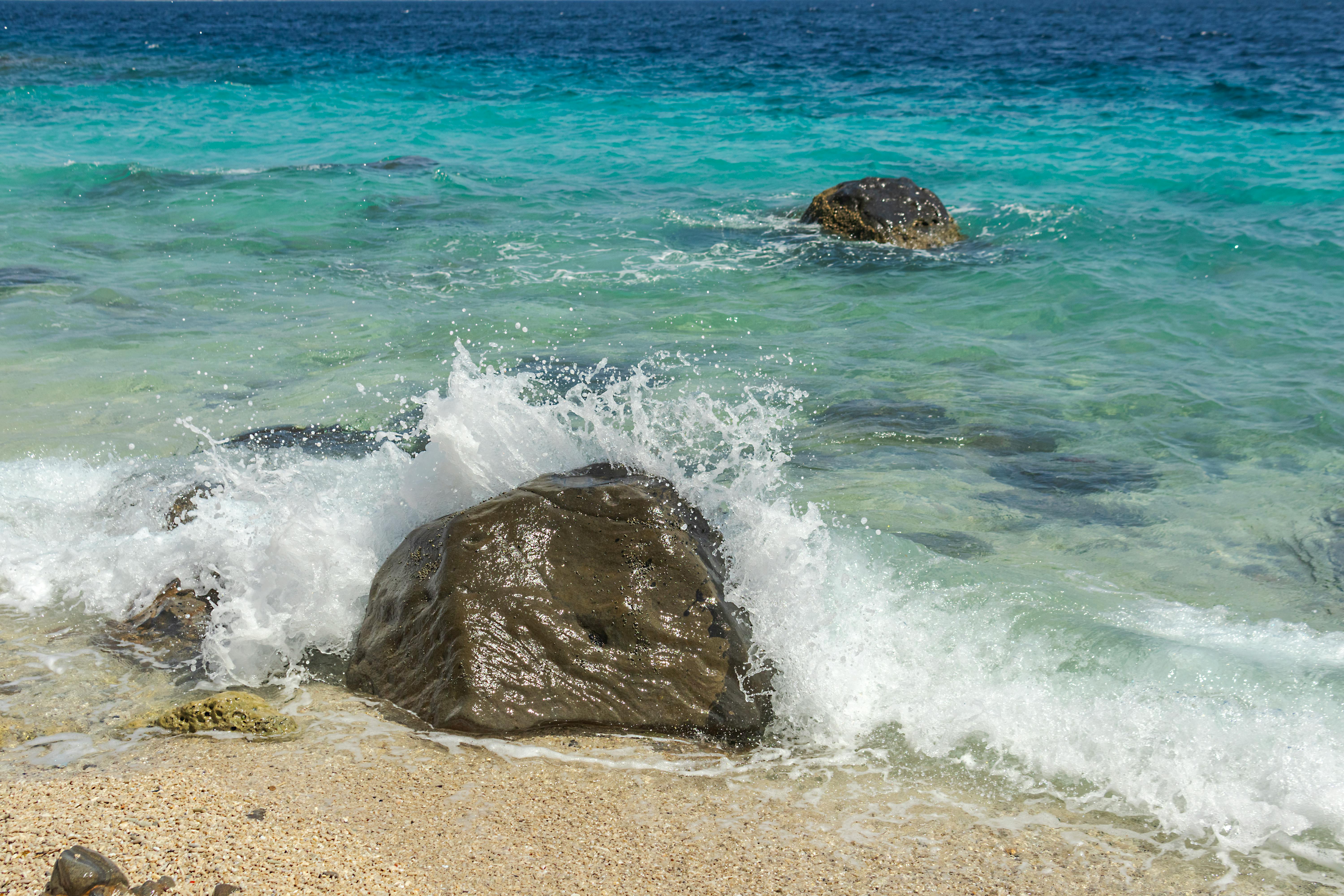Wave Crashing on Boulder · Free Stock Photo