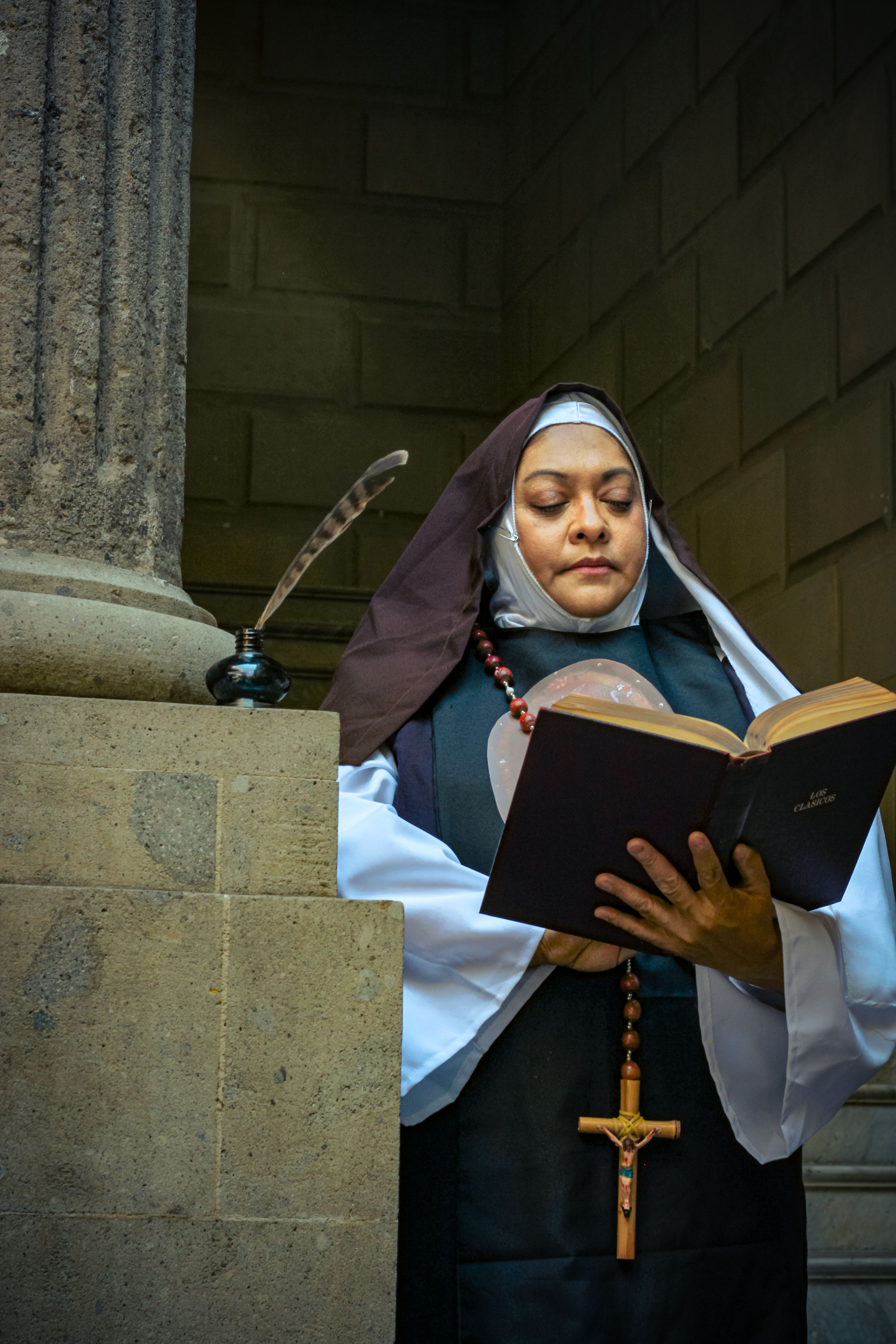 Nun Reading a Book · Free Stock Photo