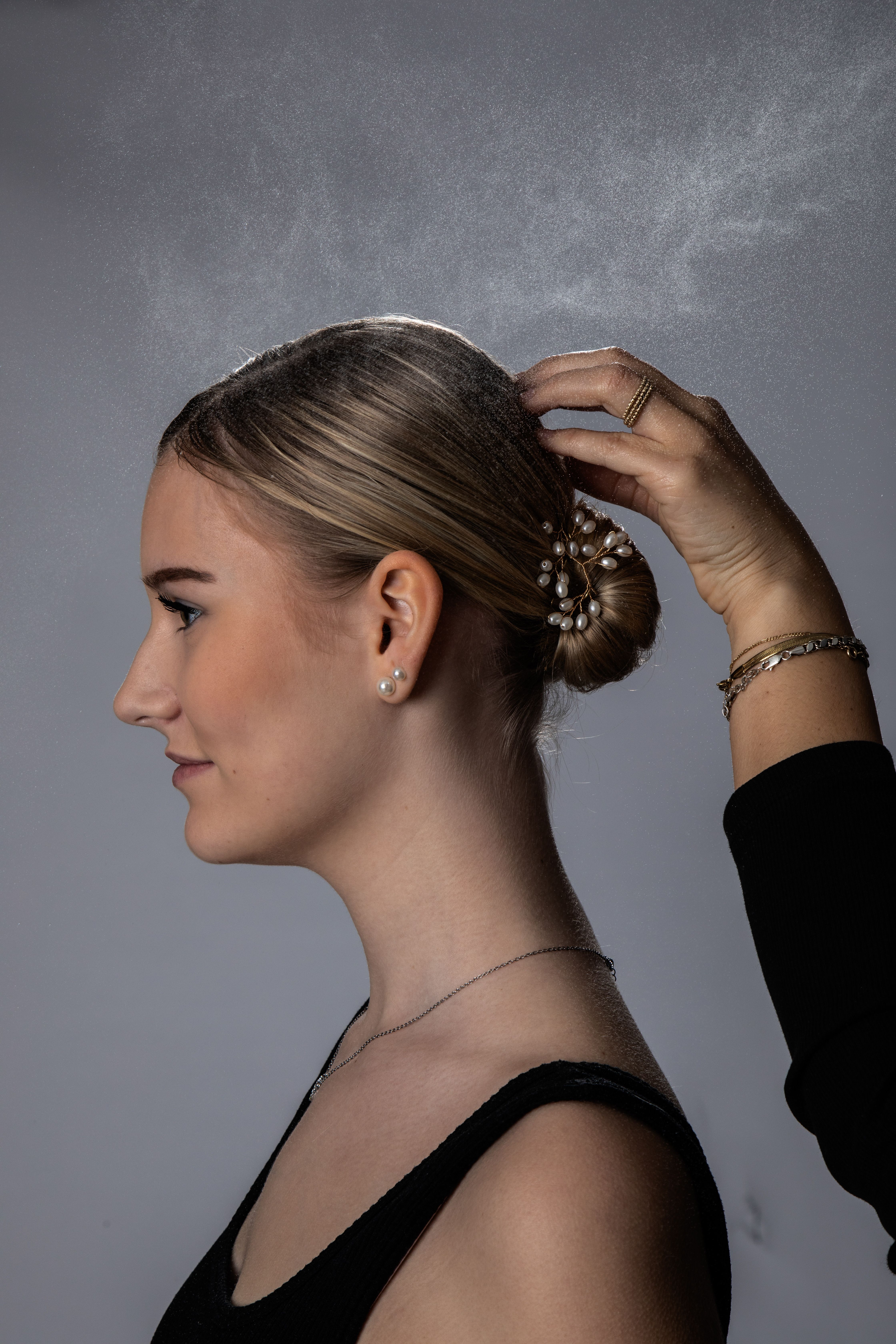 Hand Fixing Woman Hair · Free Stock Photo