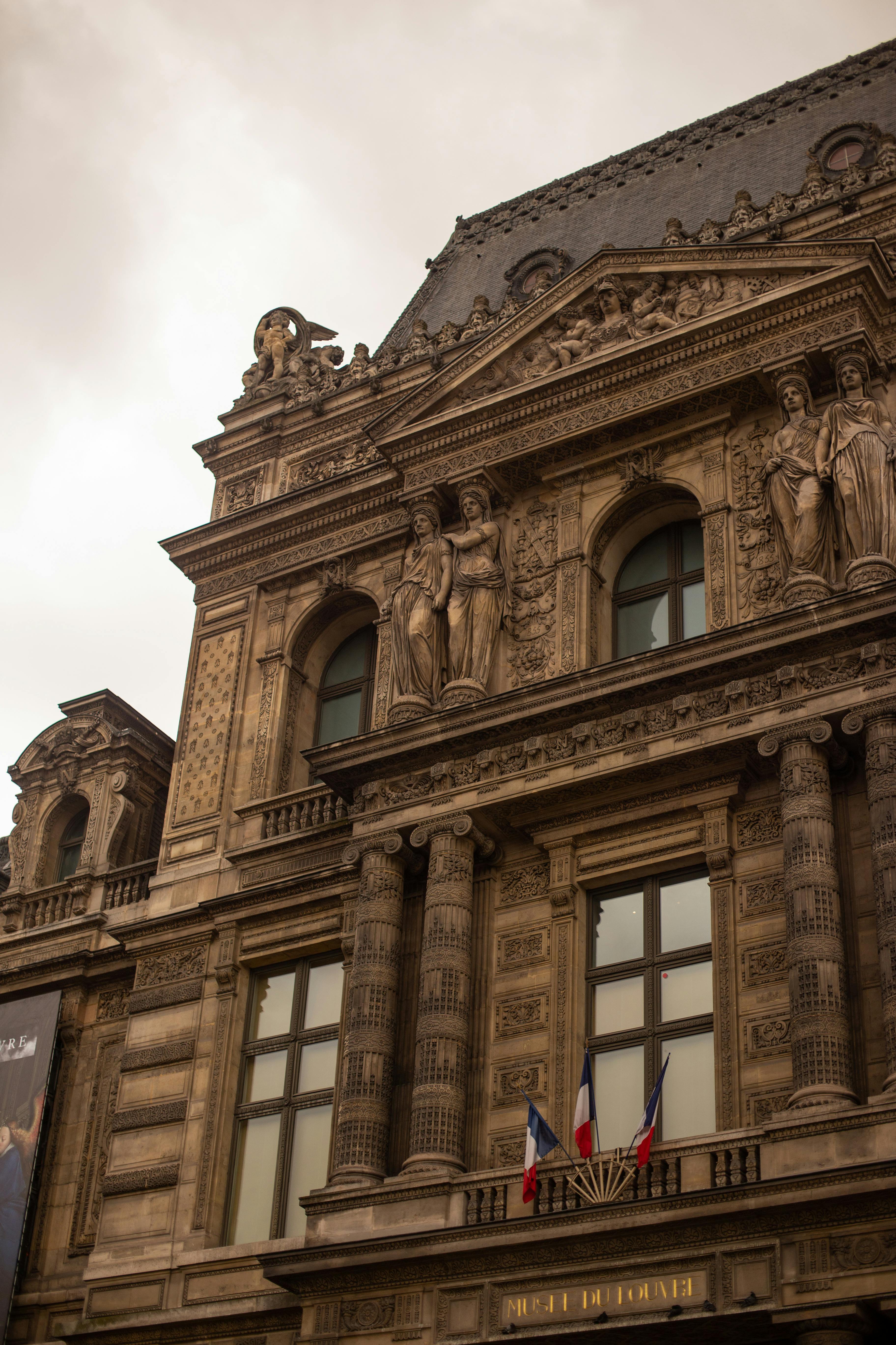 North Gate of the Louvre Palace in Paris, France · Free Stock Photo