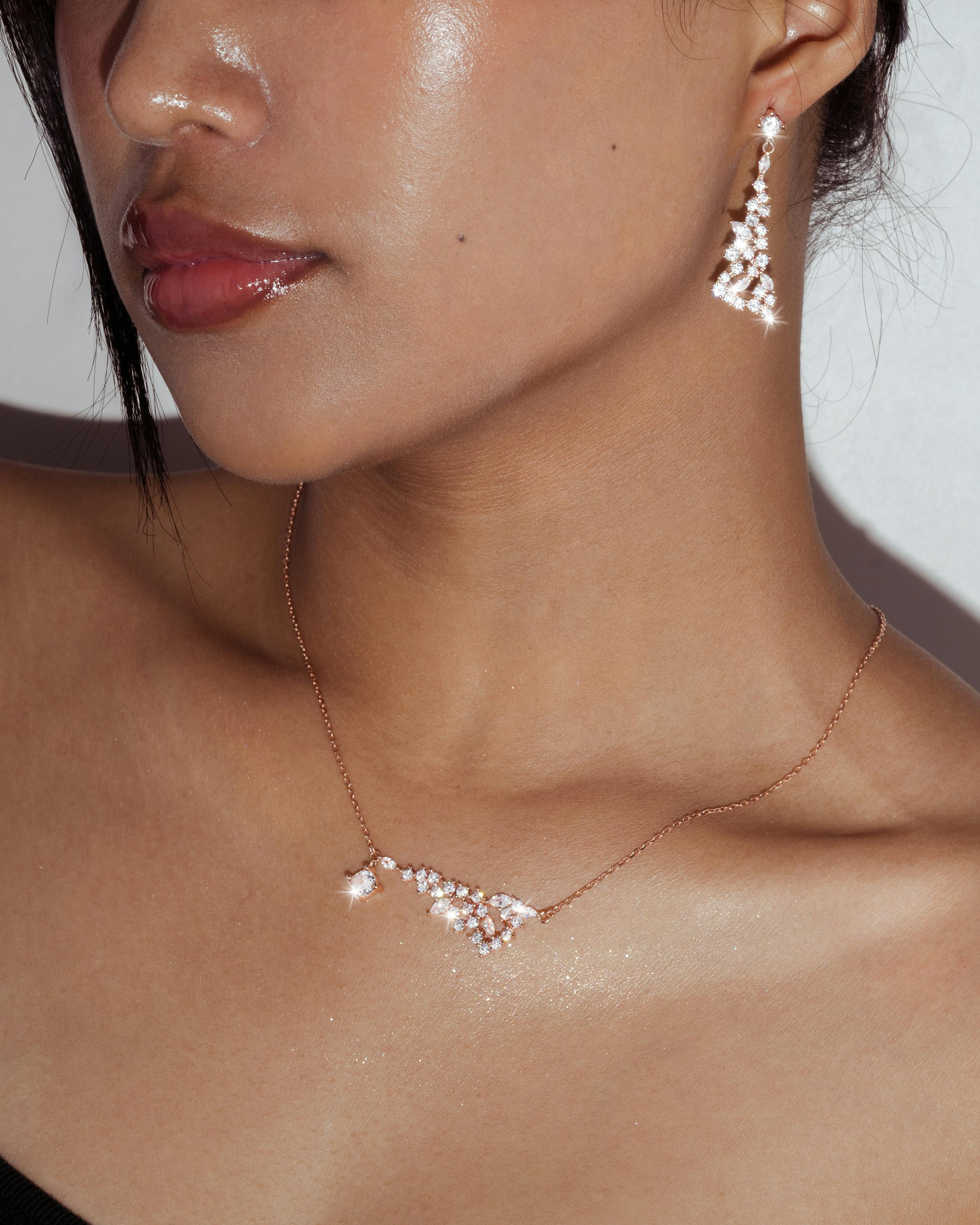 Woman Touching Gold Necklace · Free Stock Photo