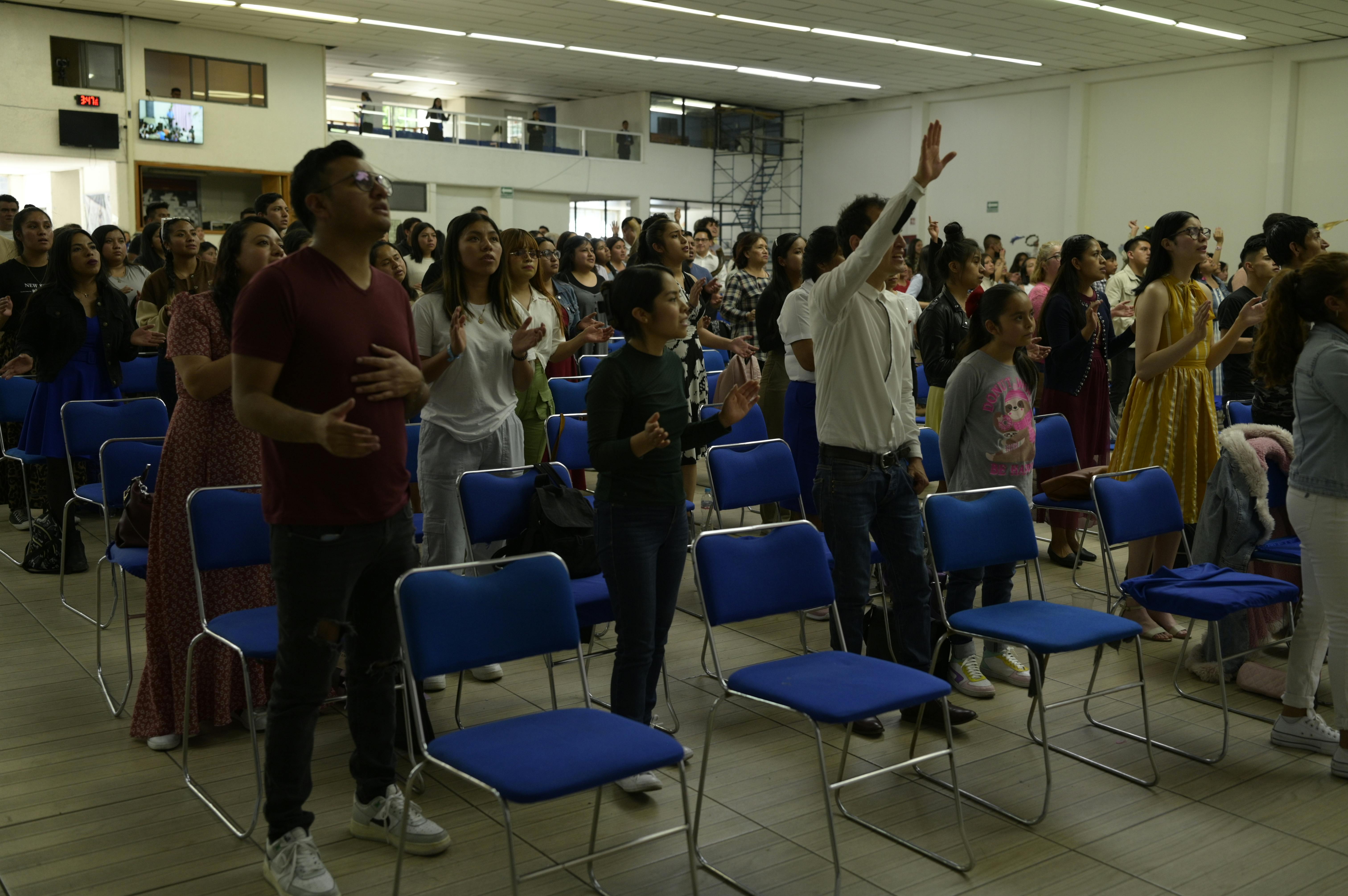 People Praying Together in Gathering · Free Stock Photo