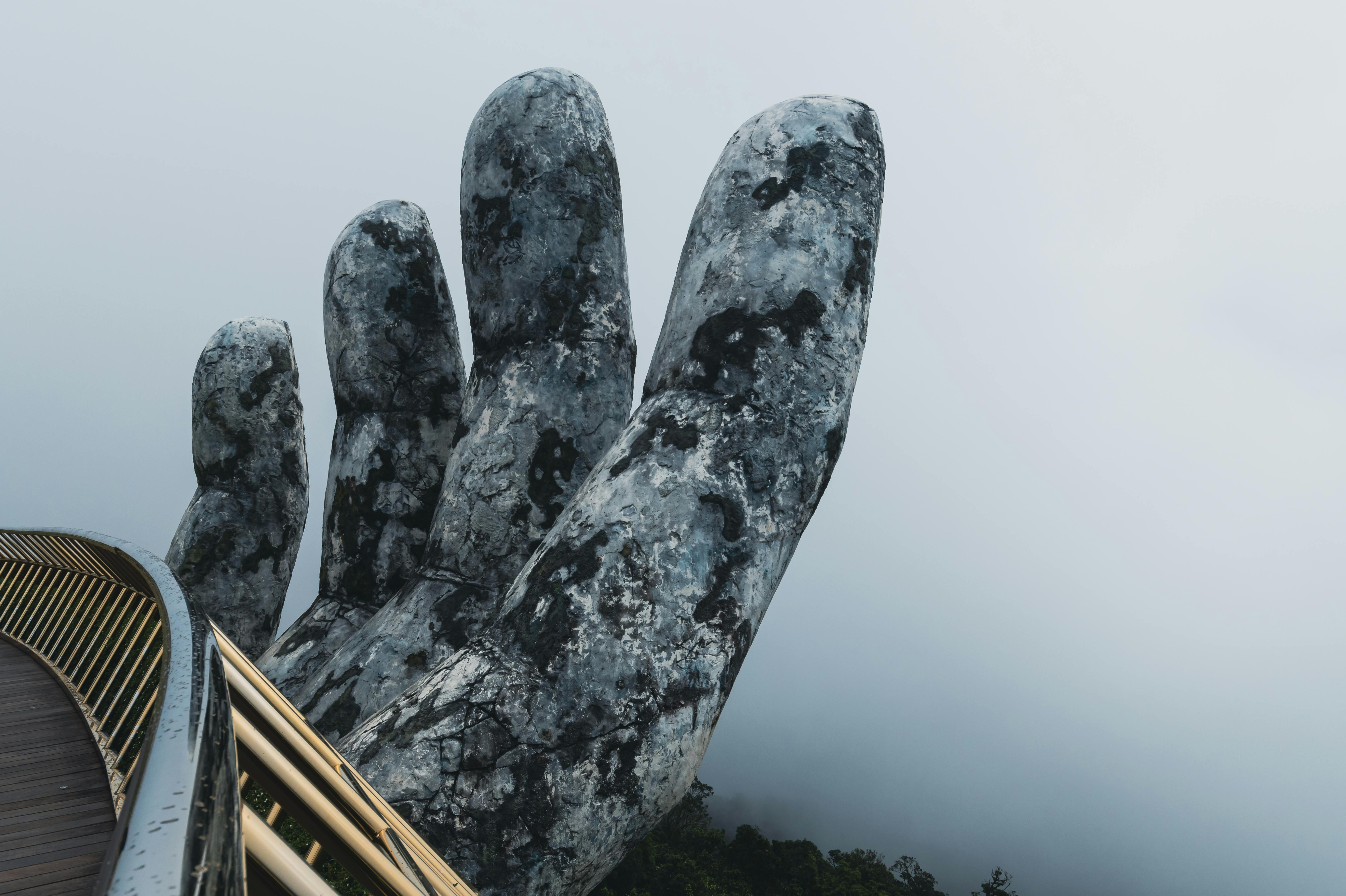Hand Holding Bridge · Free Stock Photo