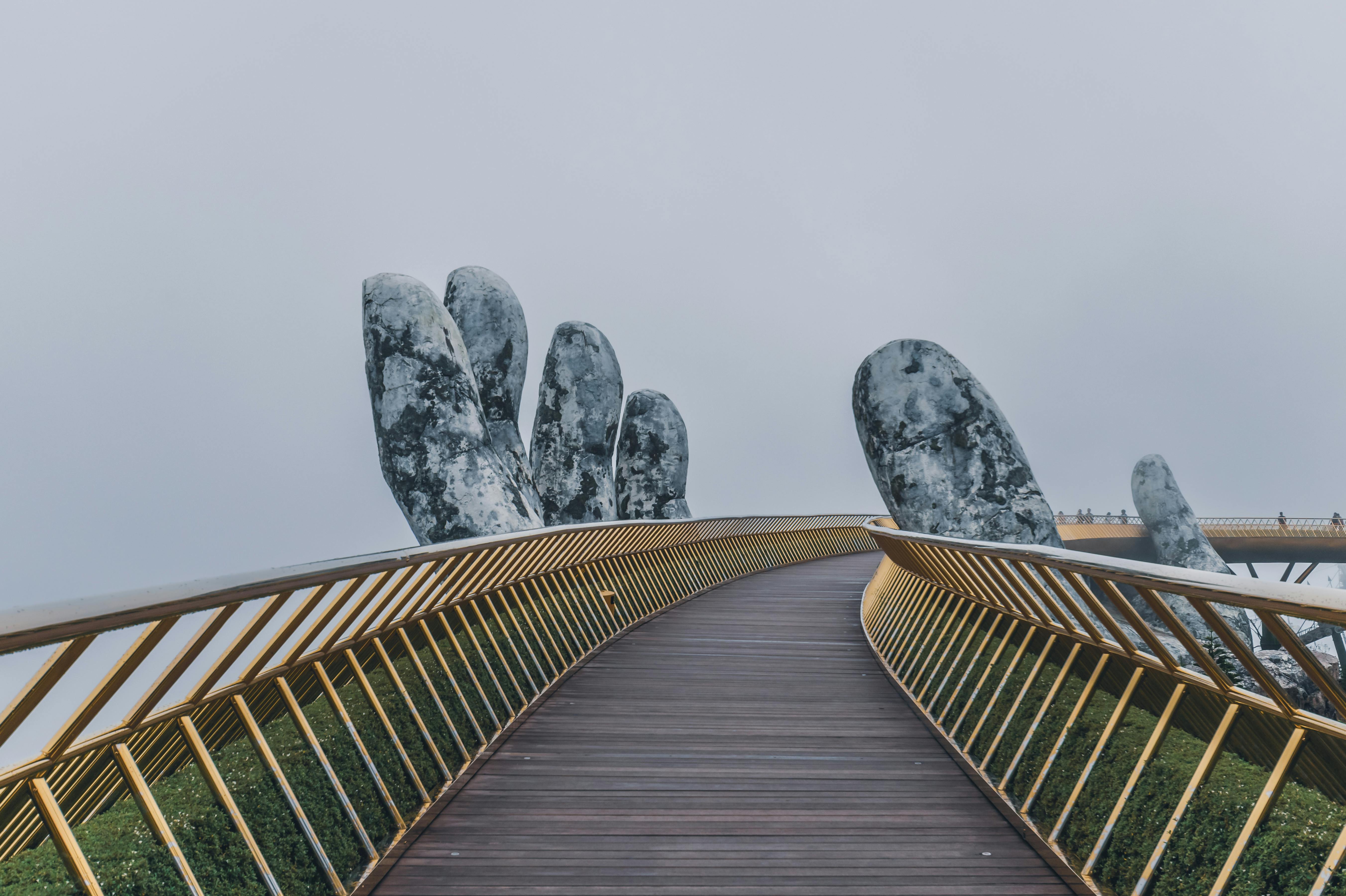 Hand Holding Bridge · Free Stock Photo