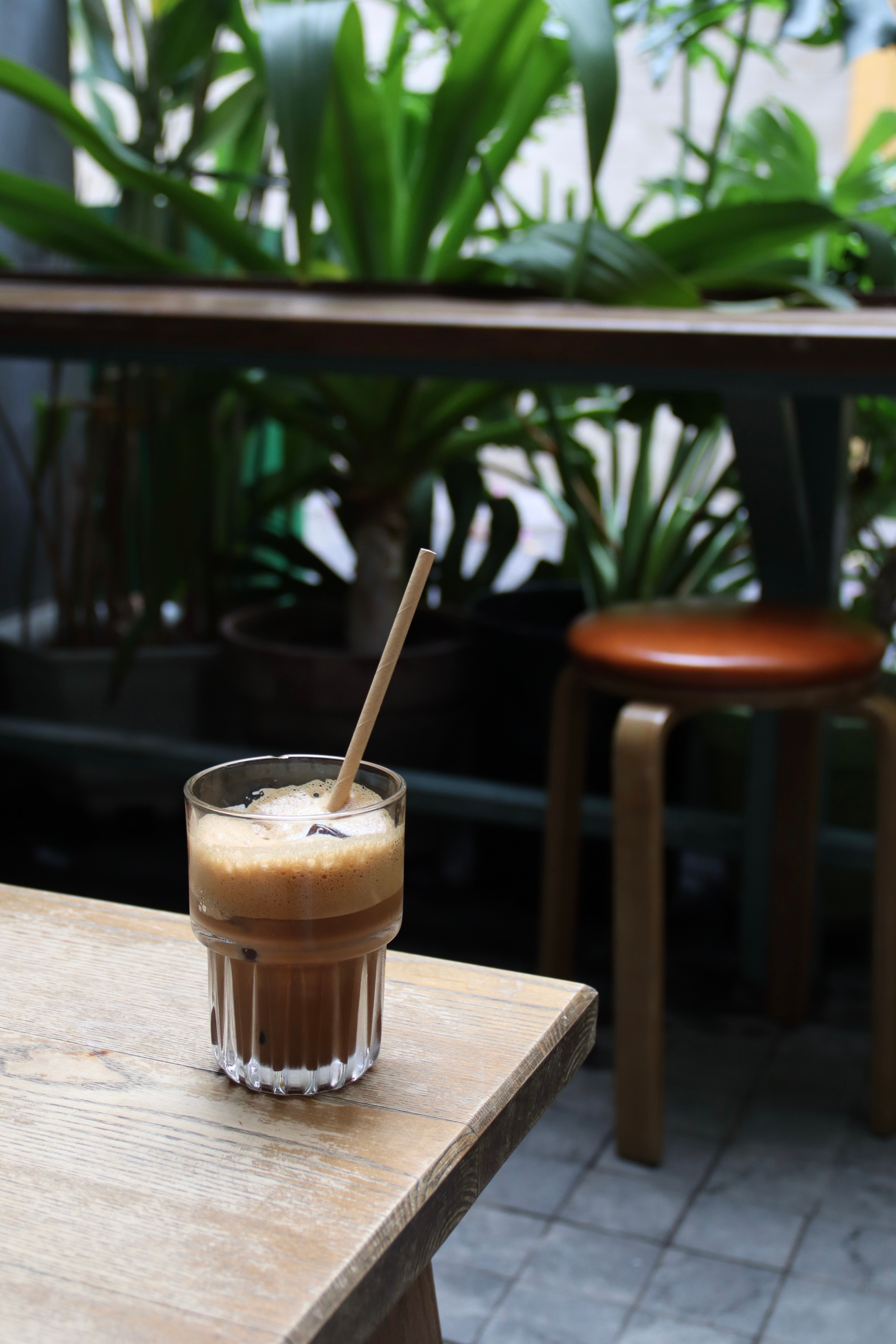 Glass of Coffee with Straw · Free Stock Photo