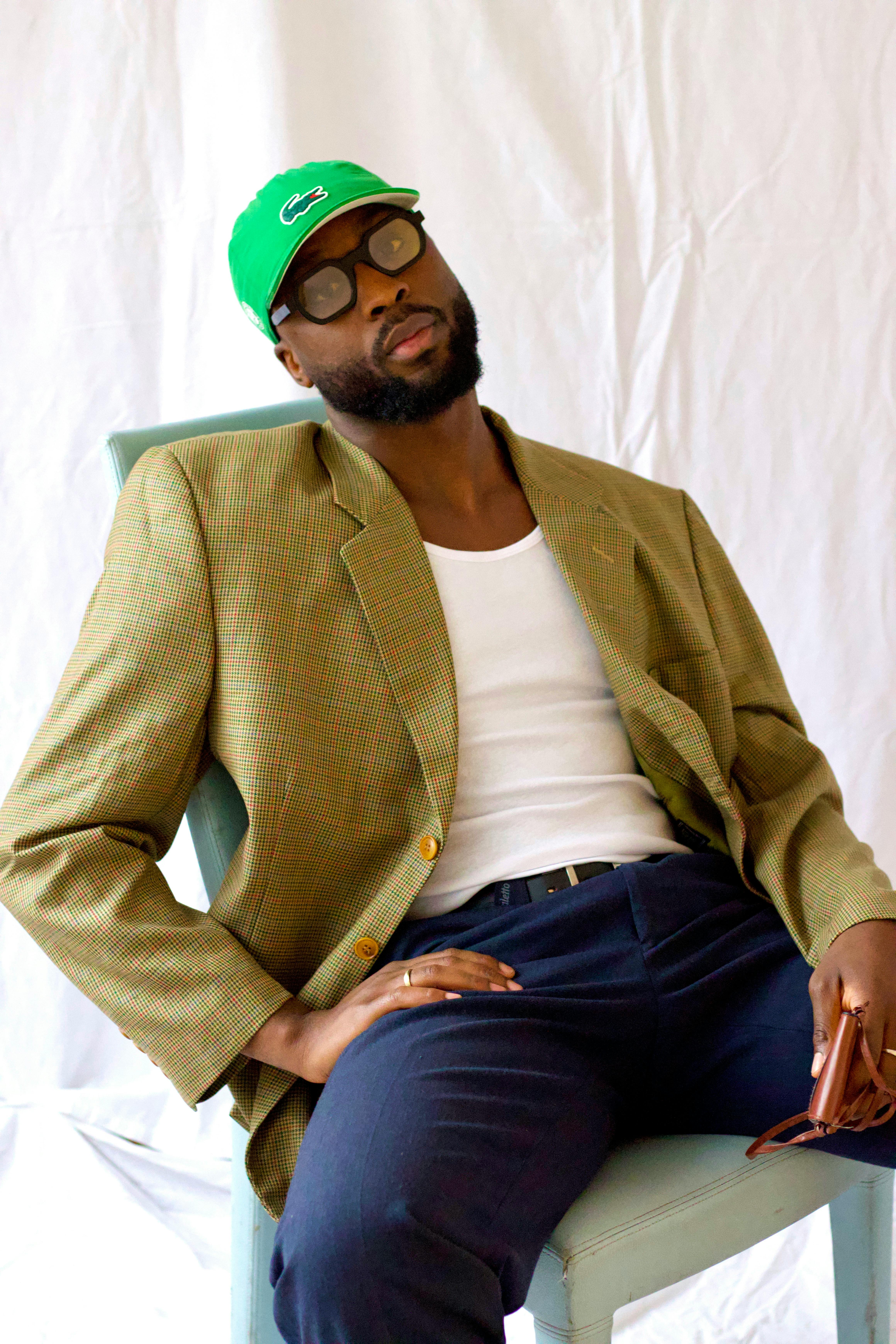 Man in Cap, Green Jacket and Eyeglasses · Free Stock Photo