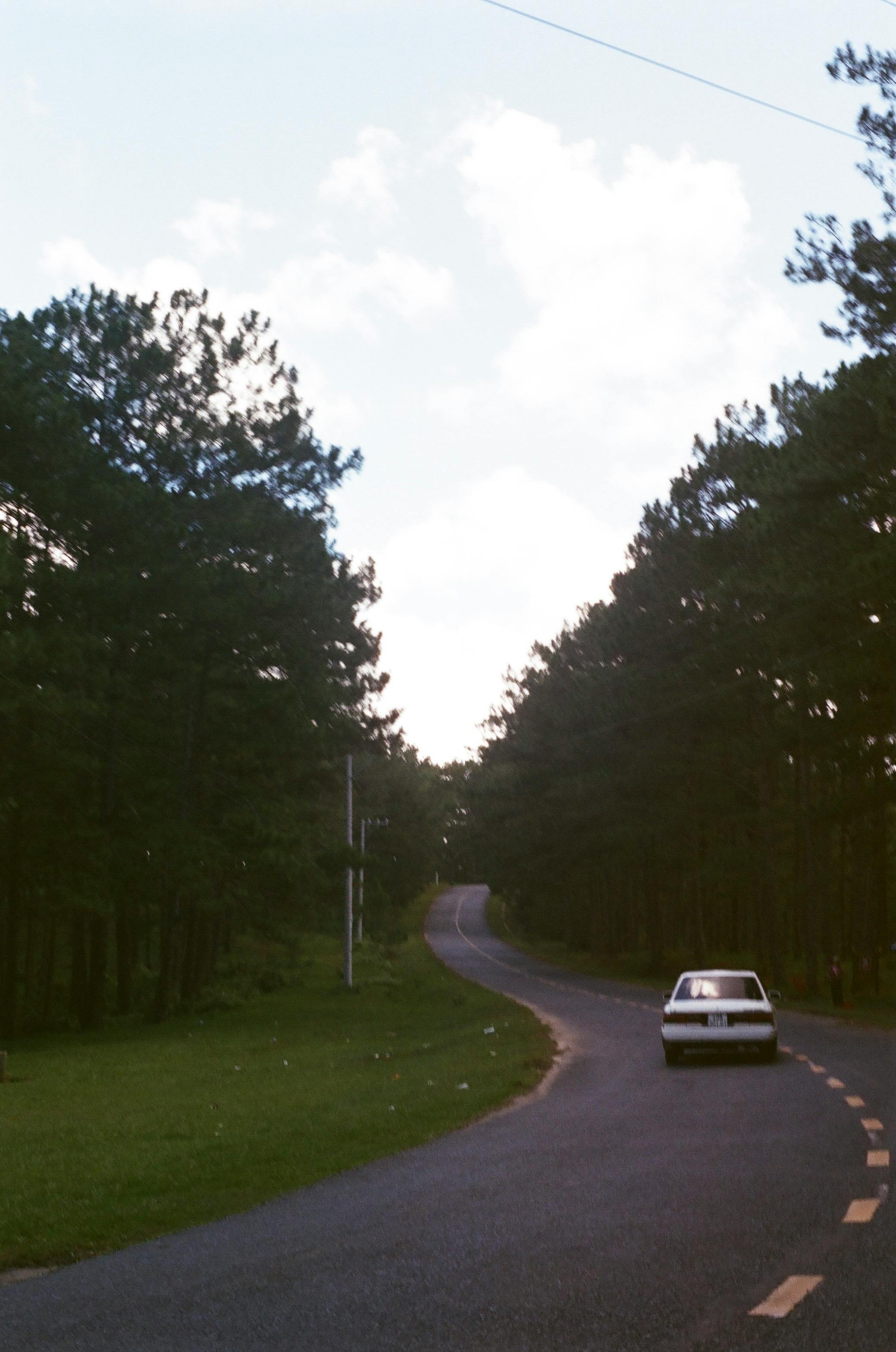 Old-fashioned Car on Rural Road · Free Stock Photo
