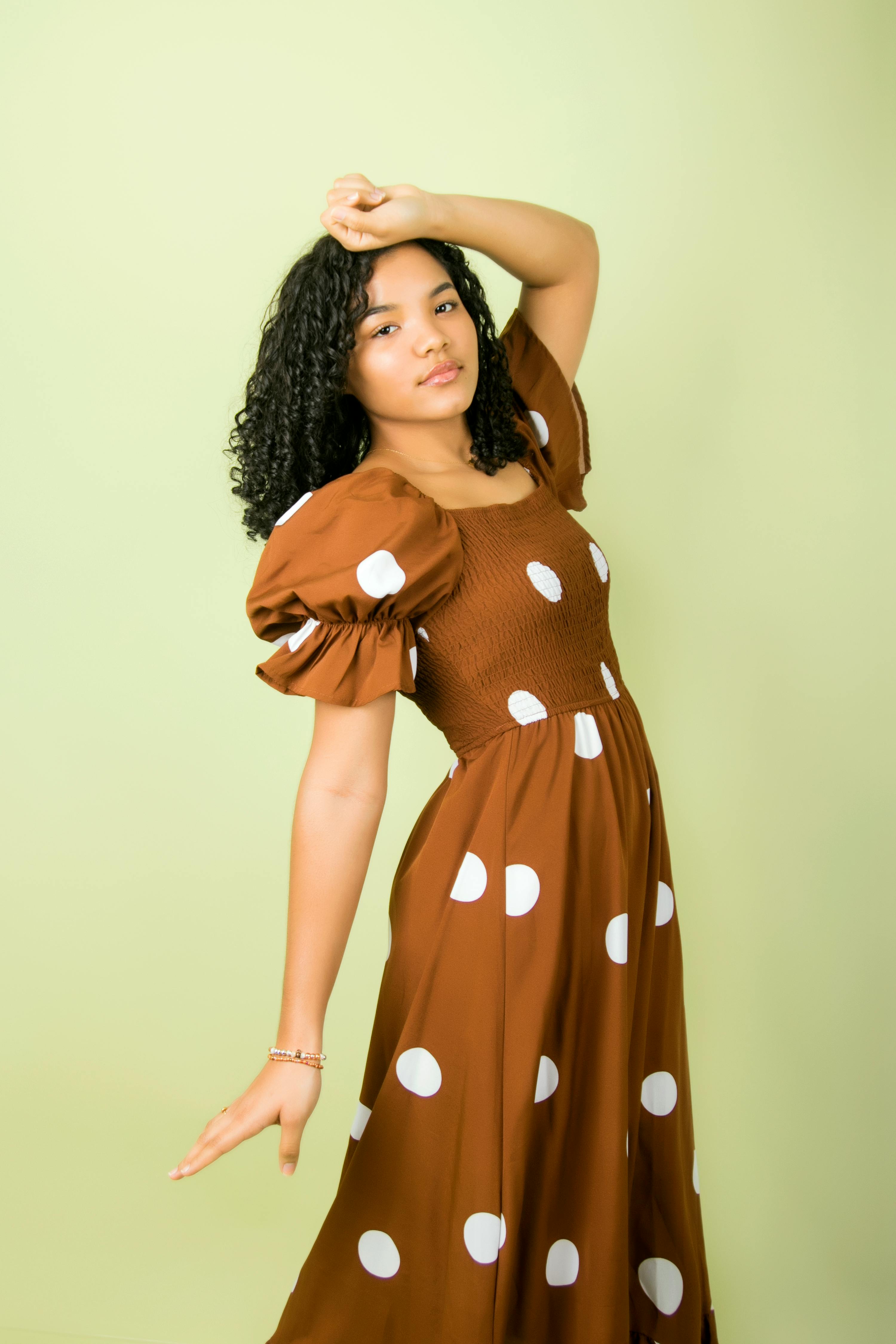 Model Posing in Green Dress and Red Lipstick · Free Stock Photo