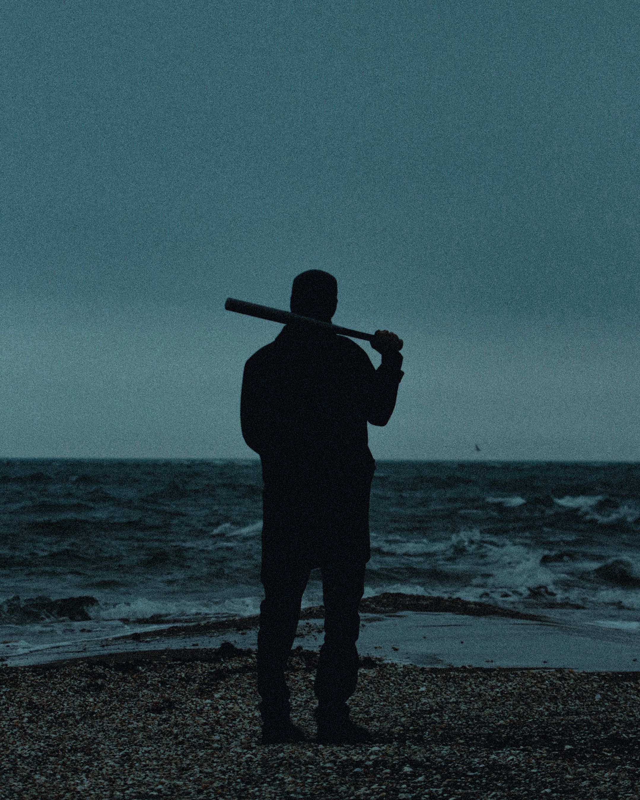 The cover of the book, the man with the bat · Free Stock Photo