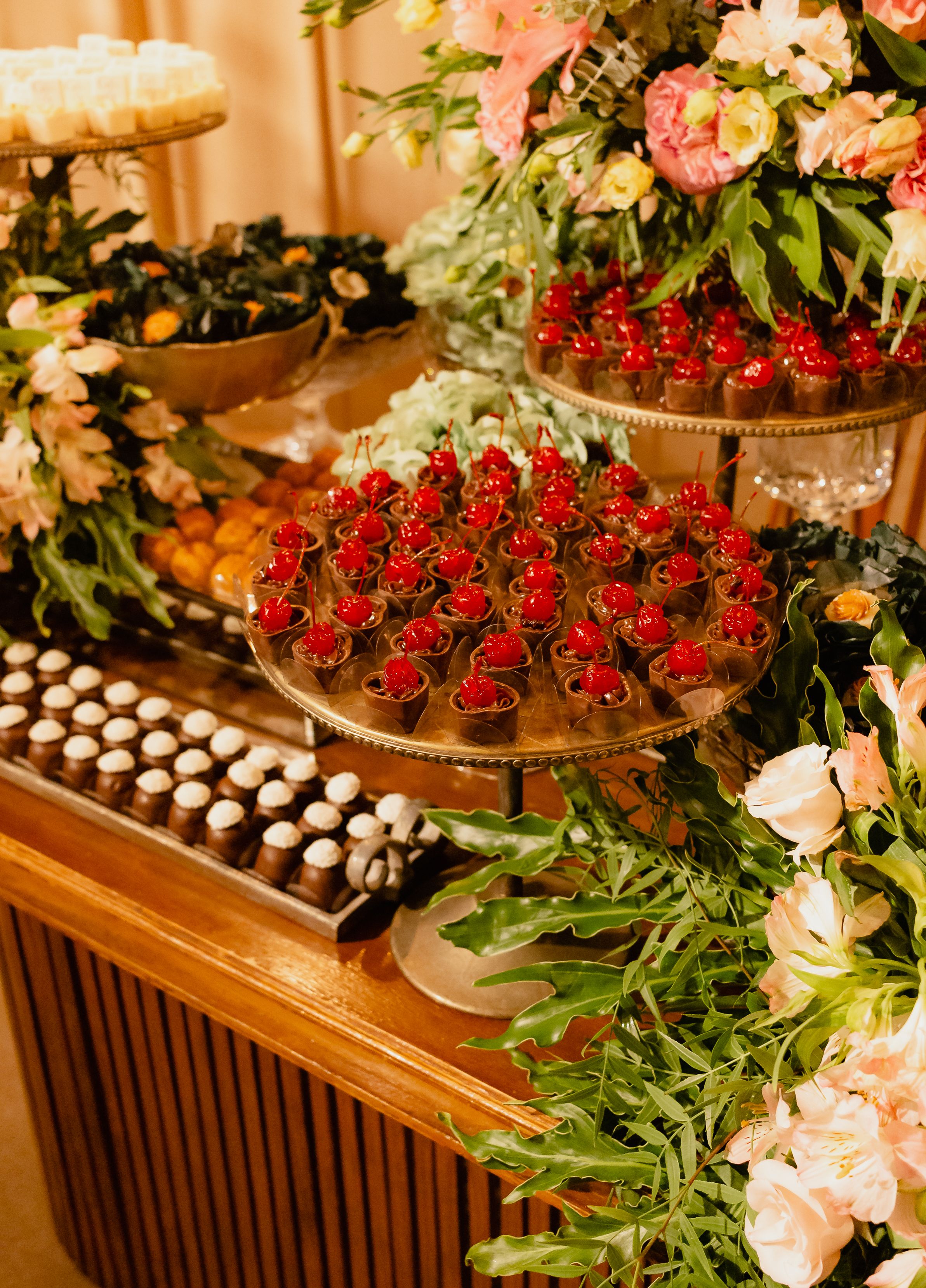 Chocolate Pralines on Tray among Bouquet of Flowers · Free Stock Photo