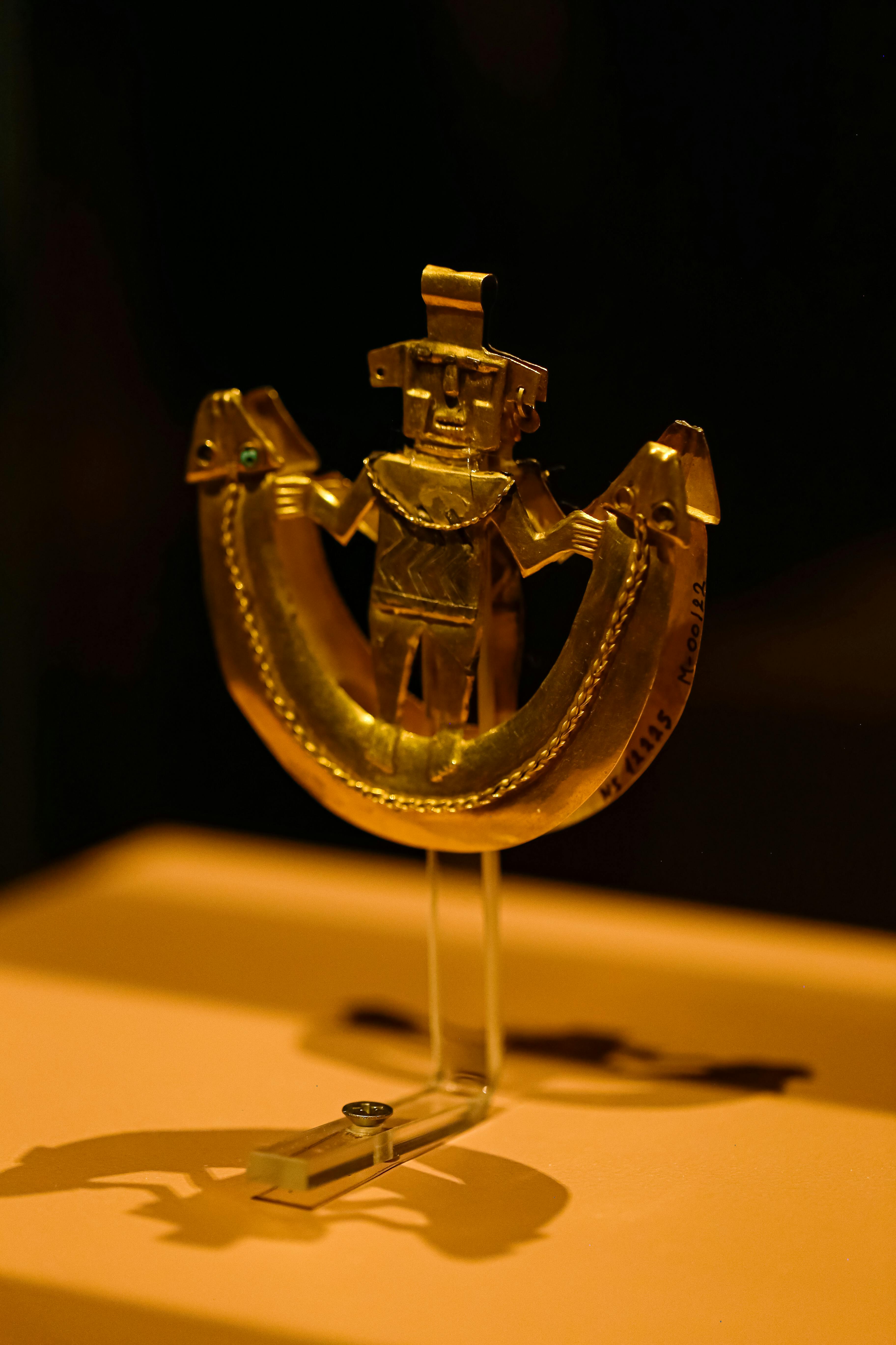 Golden Figurine at Museum · Free Stock Photo