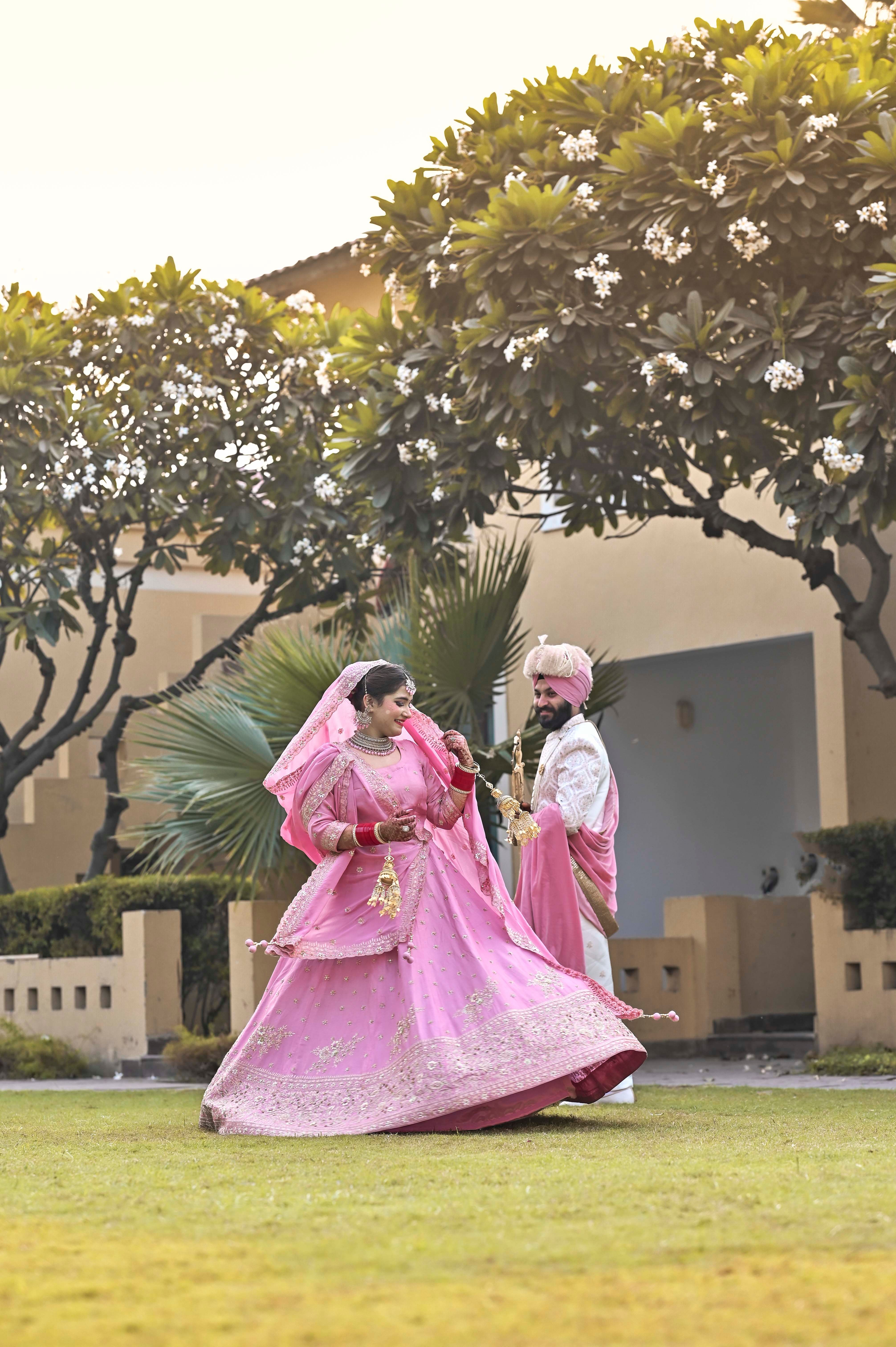 Couple in Pink Clothes Dancing · Free Stock Photo