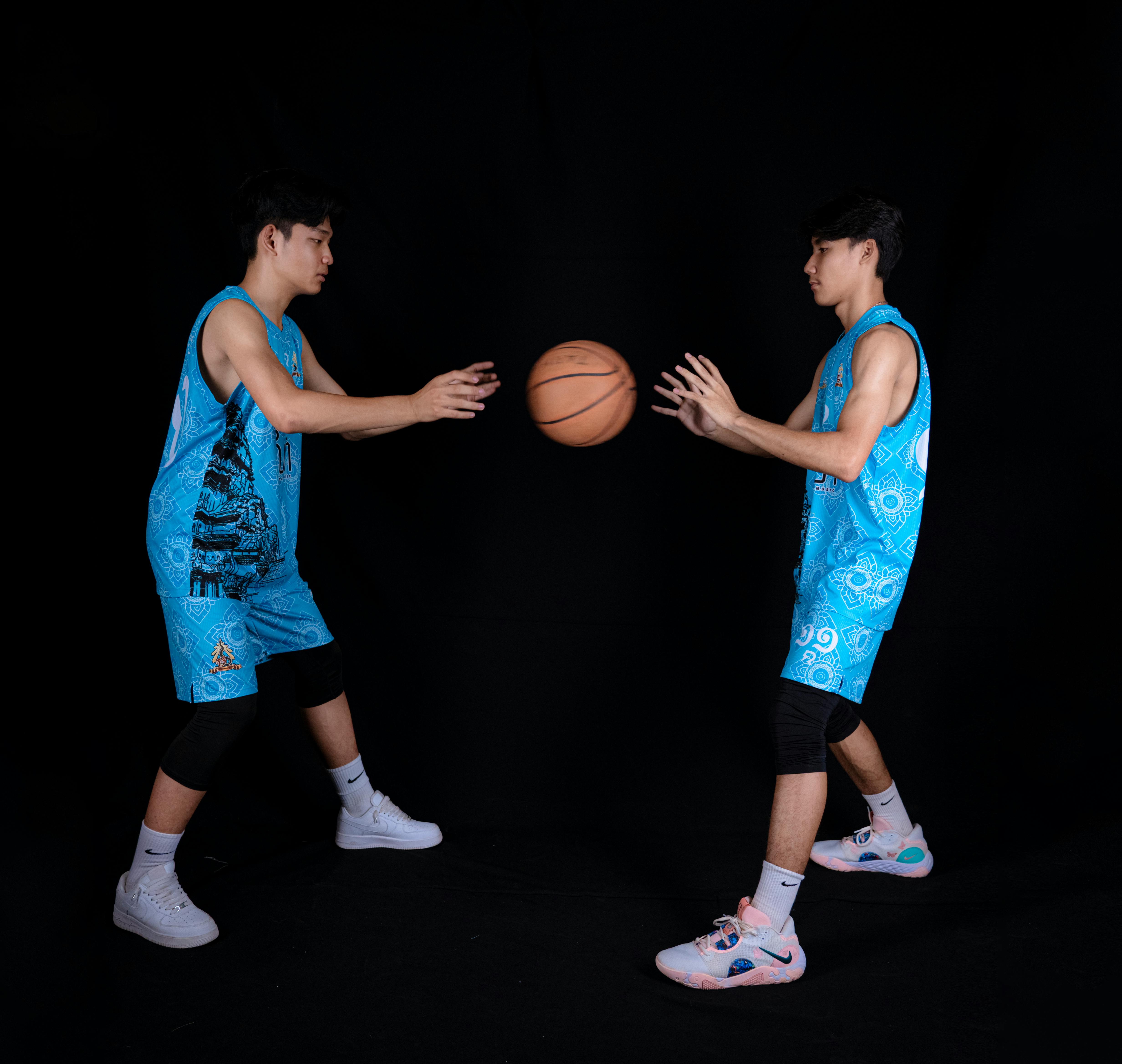 Basketball Players Passing a Basketball Close · Free Stock Photo