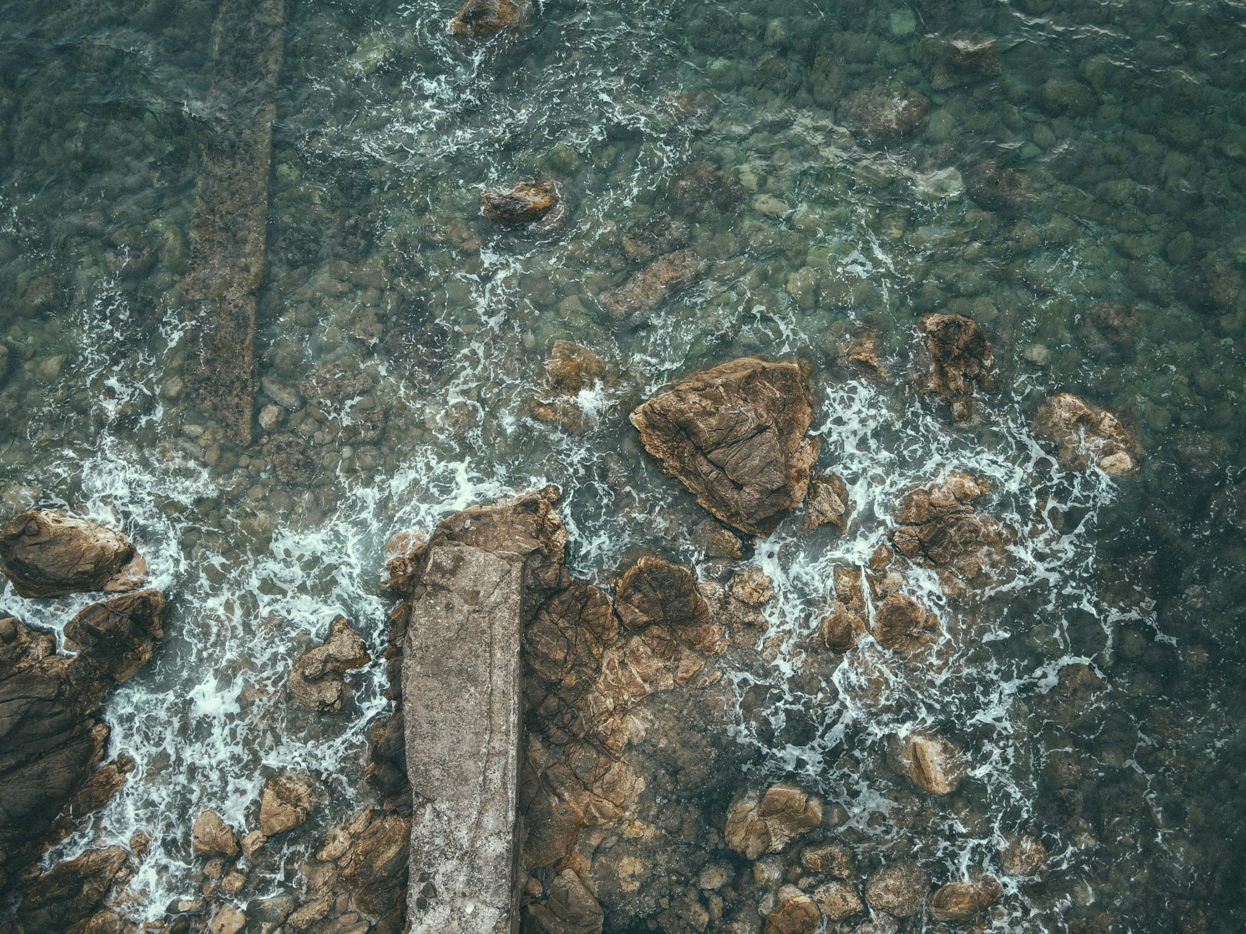 Aerial view of rocks and water · Free Stock Photo