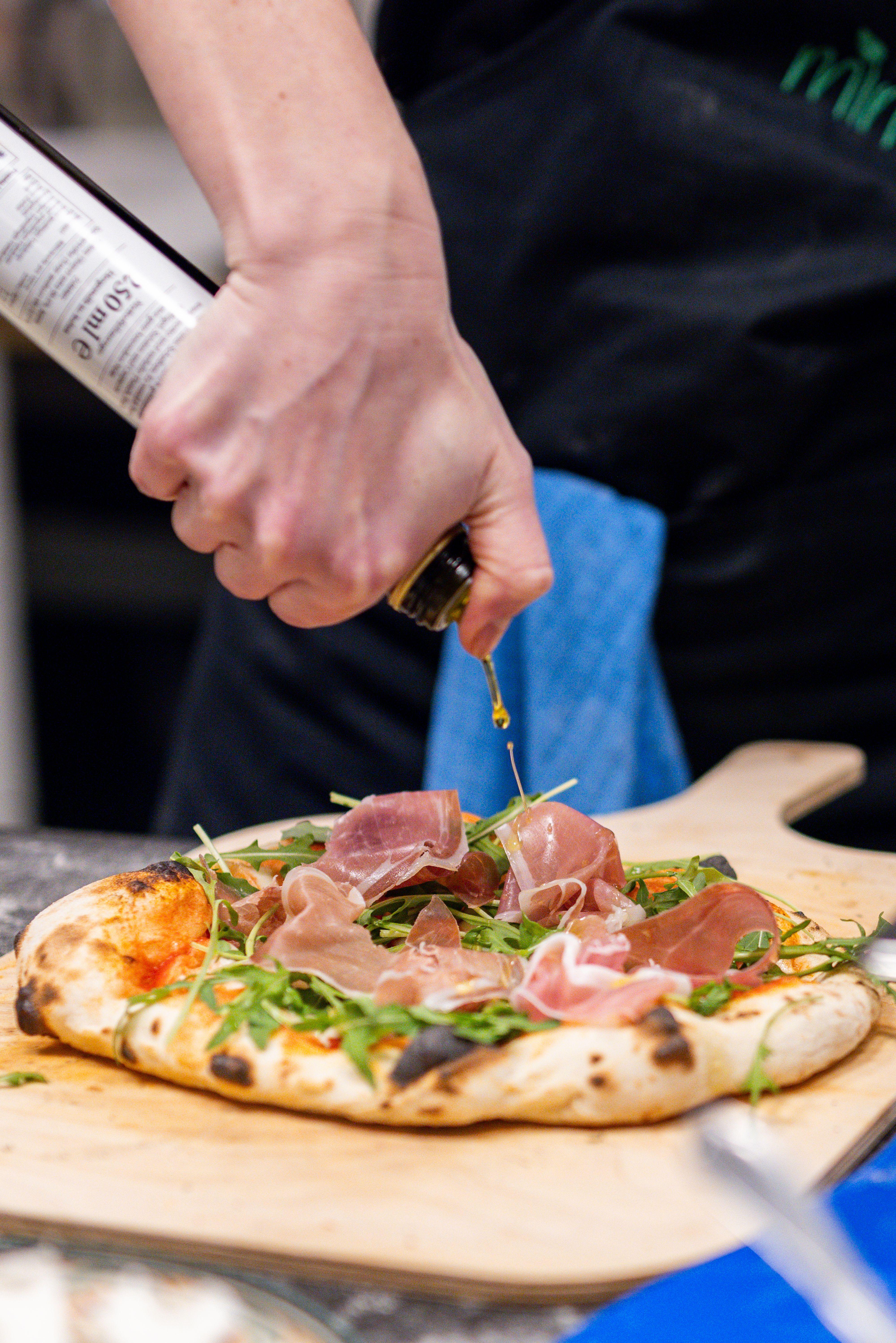 Hand of a Man Preparing Pizza · Free Stock Photo