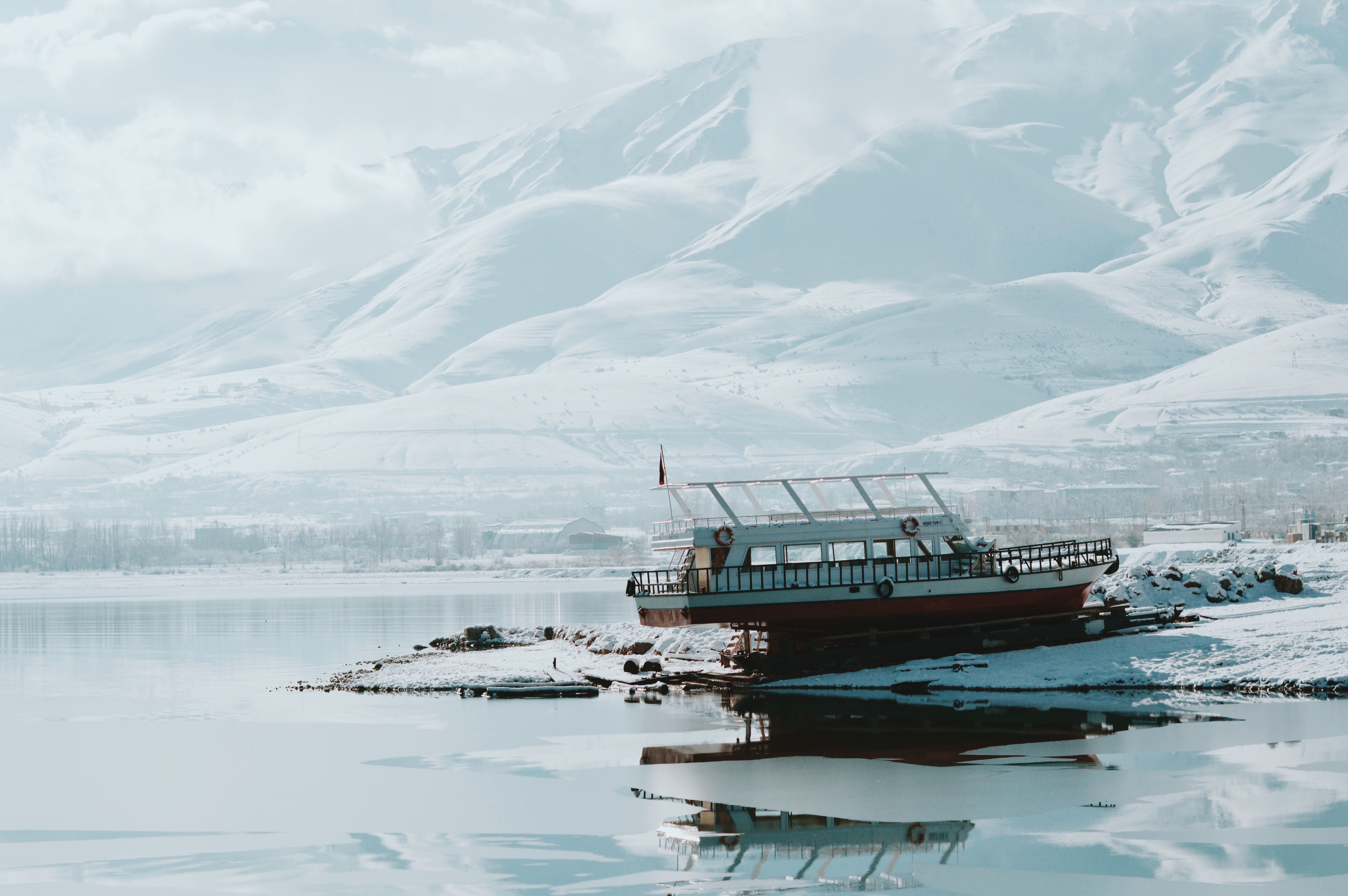 Passenger Ship Moored on Sea Coast · Free Stock Photo