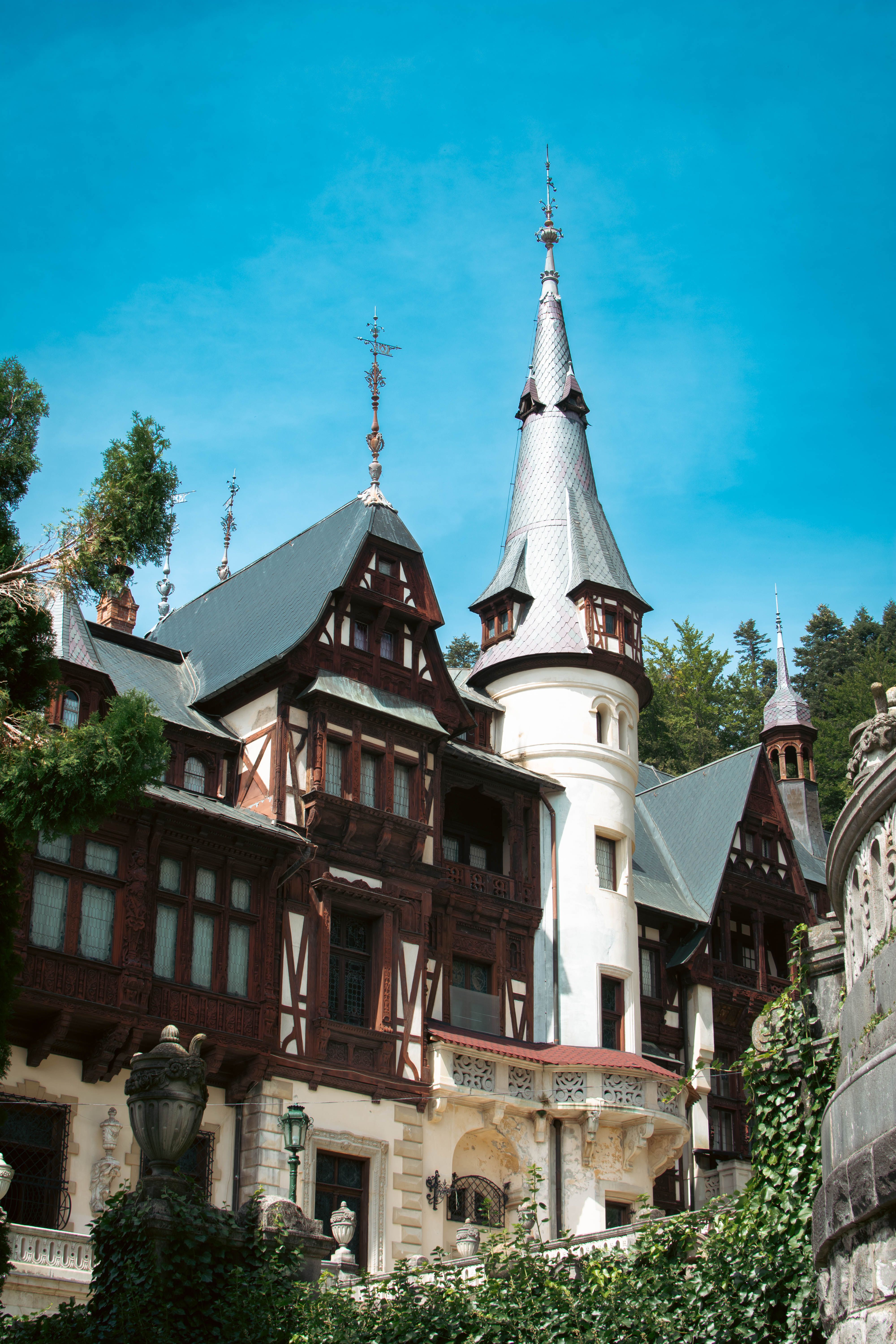 A large castle with a steeple on top · Free Stock Photo