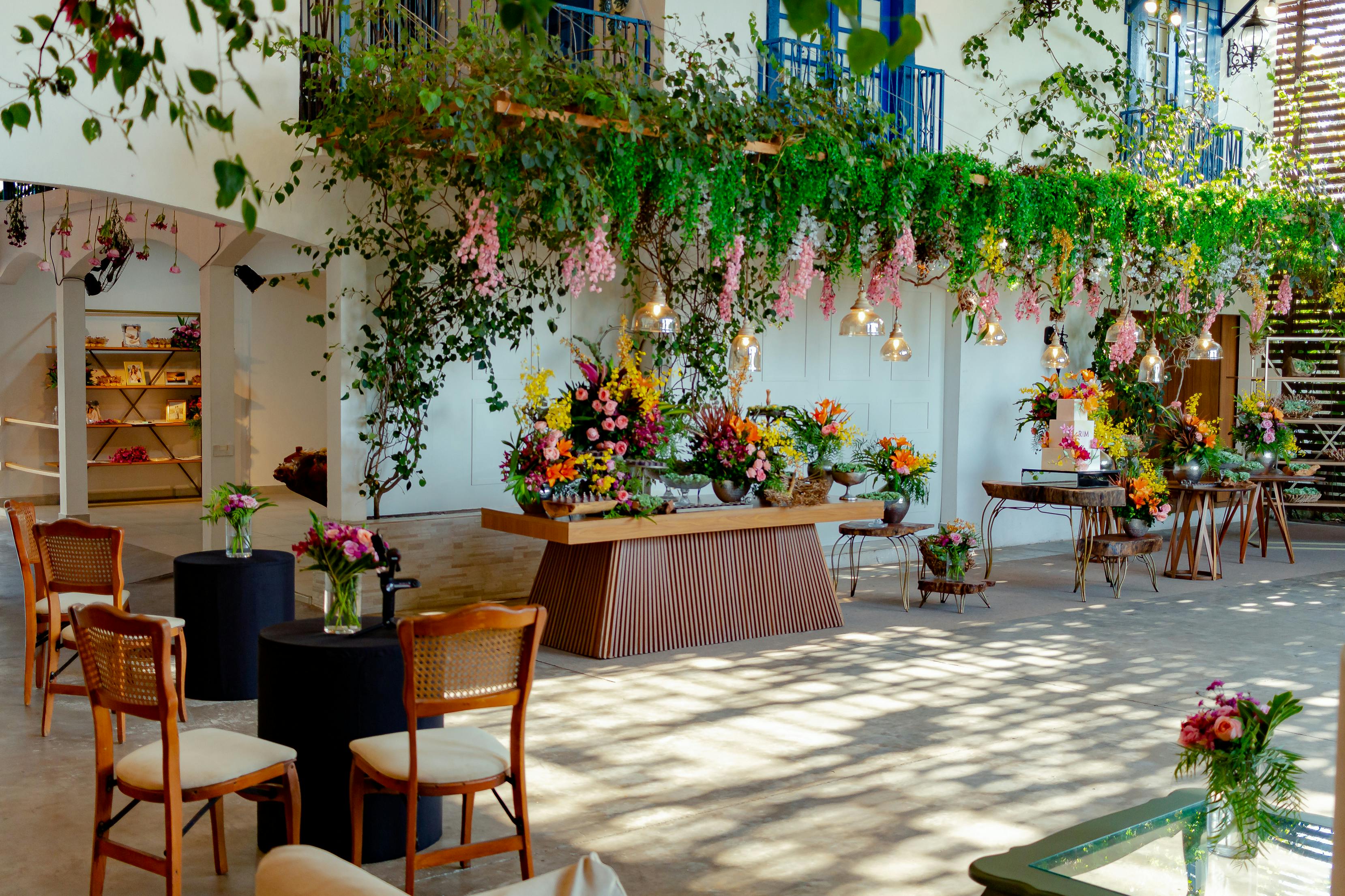 Cozy Restaurant Decorated with Flowers · Free Stock Photo