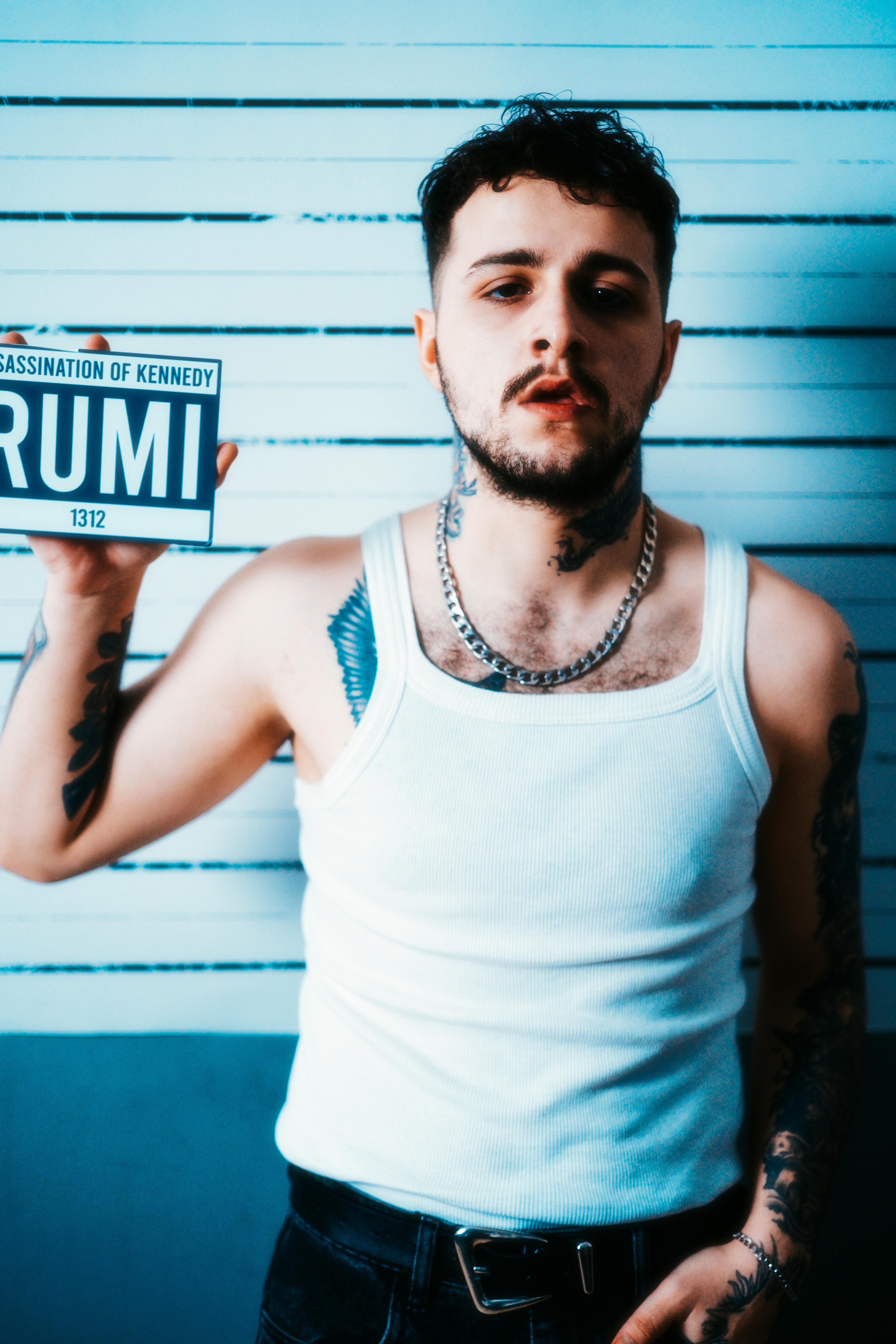 Man Standing in Prison Photo Shoot · Free Stock Photo