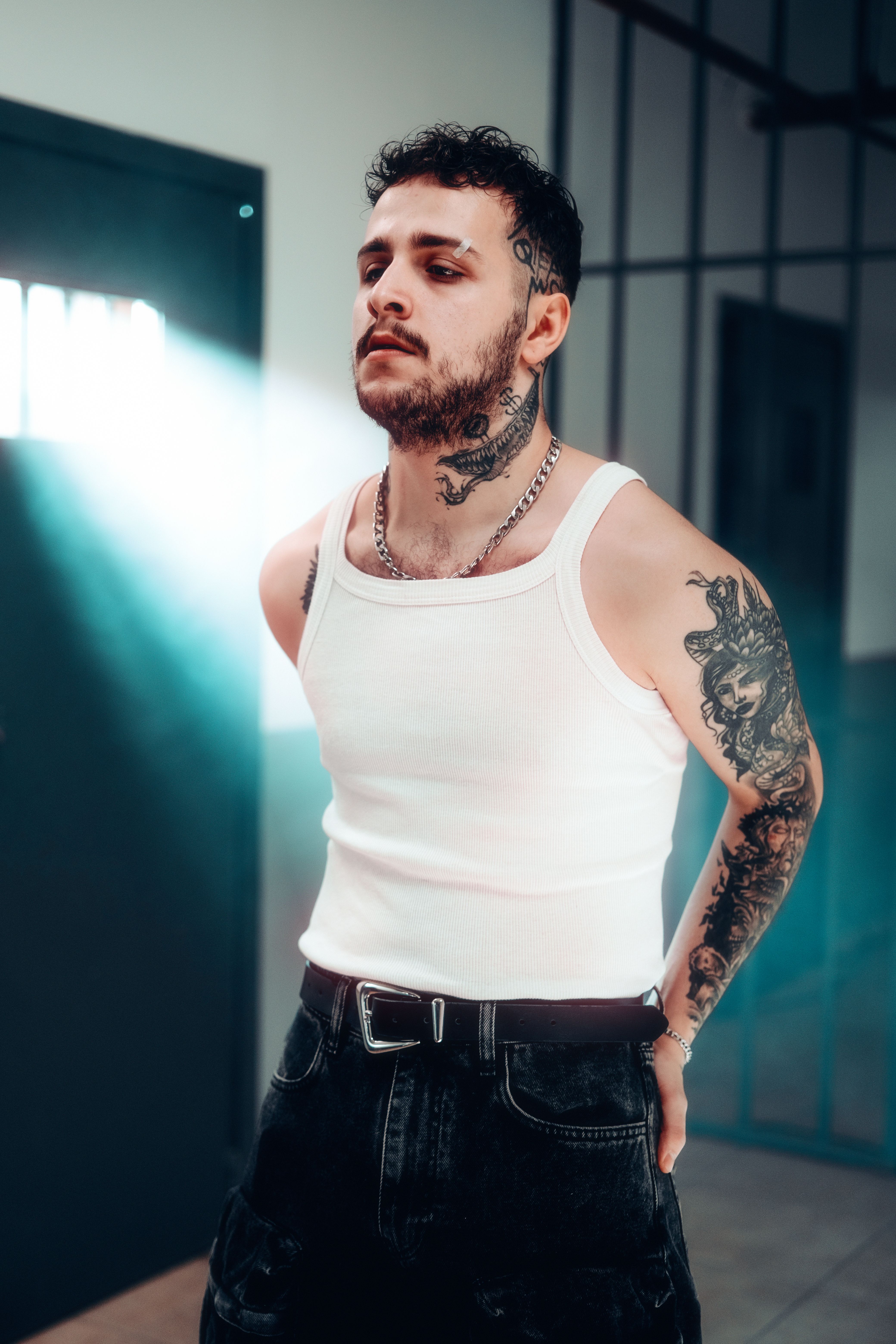 Portrait of Man in Tank Top in Prison · Free Stock Photo