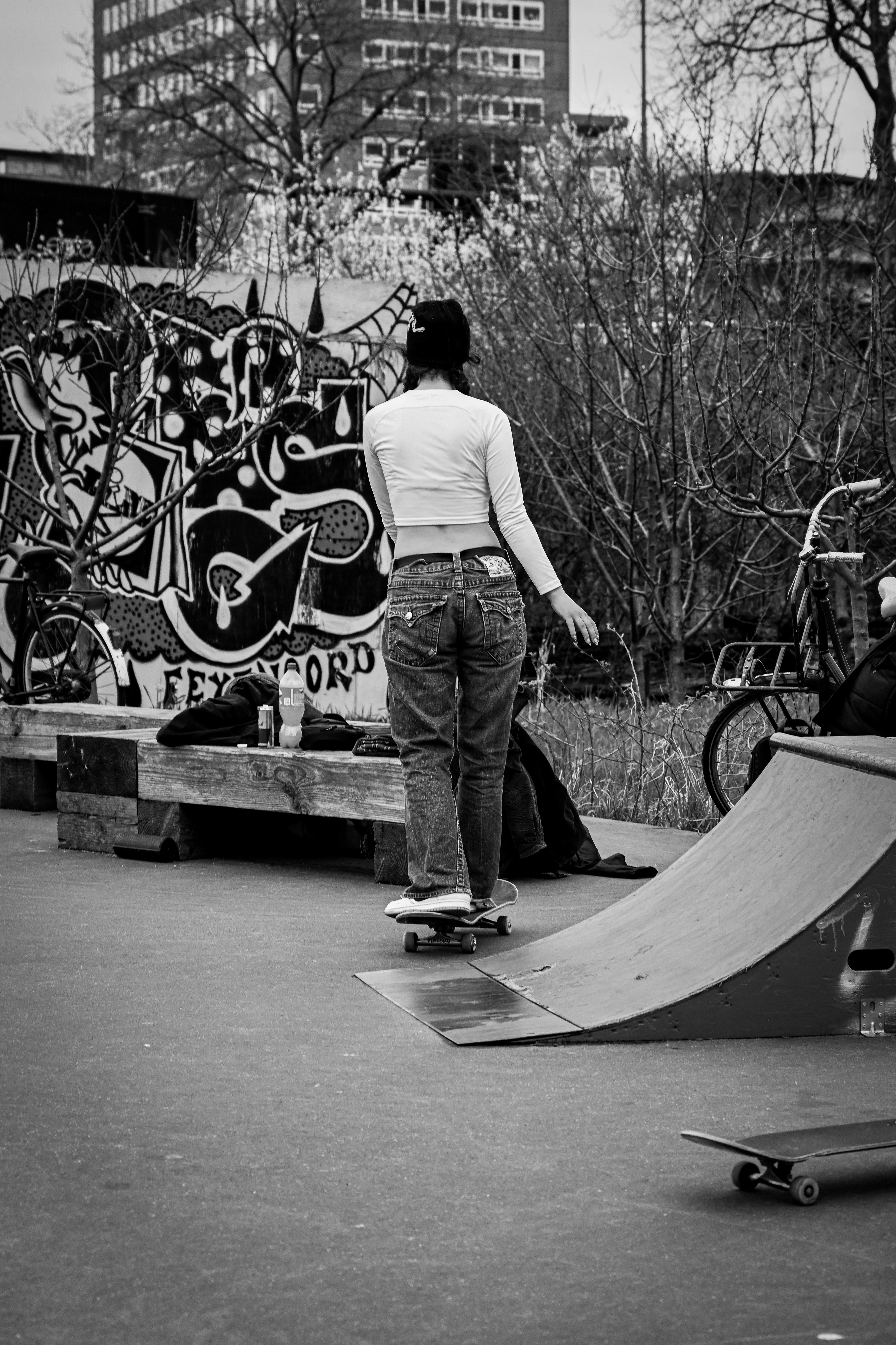 Back View of Woman Skateboarding at Skatepark · Free Stock Photo
