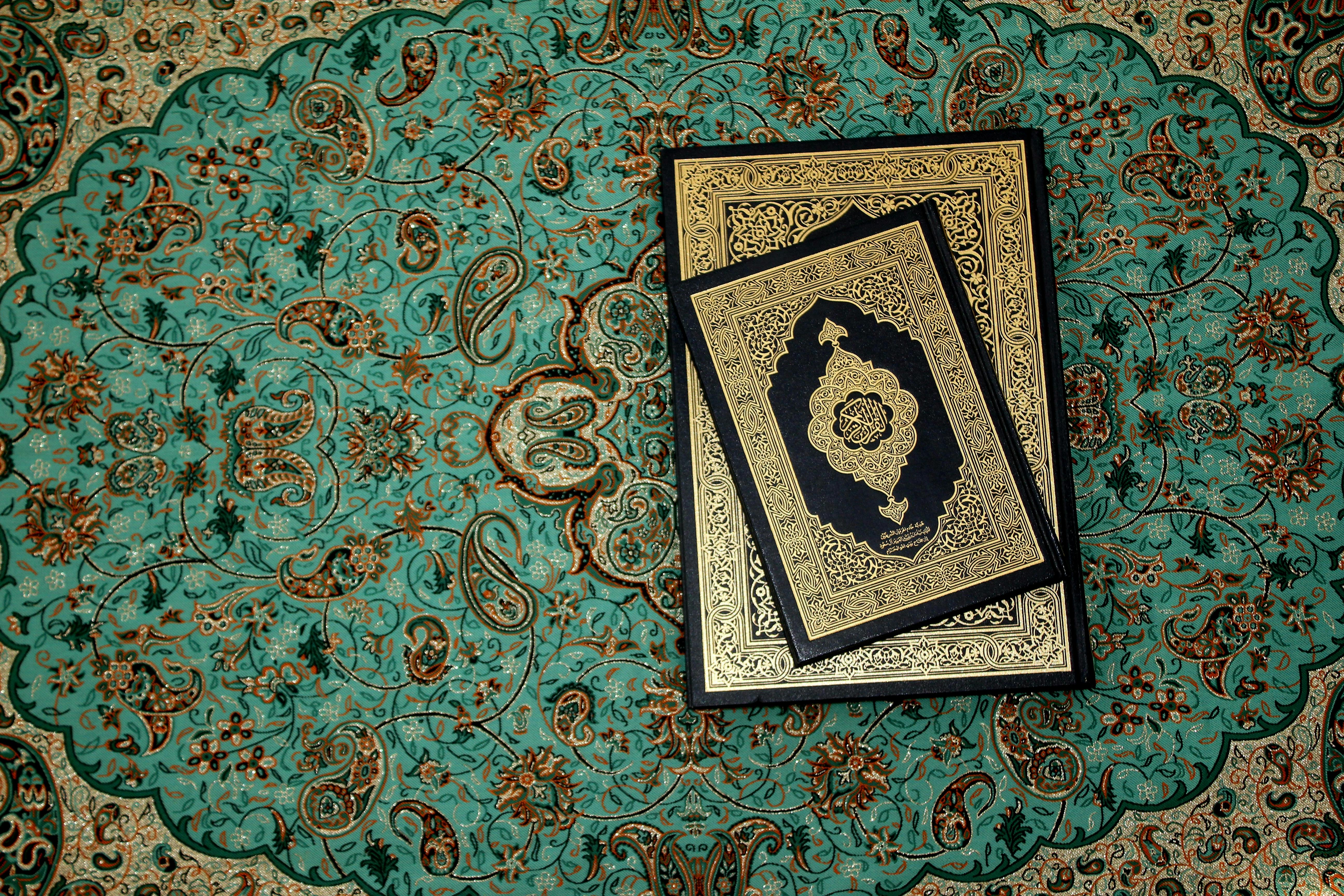 Ornamented Koran Books · Free Stock Photo