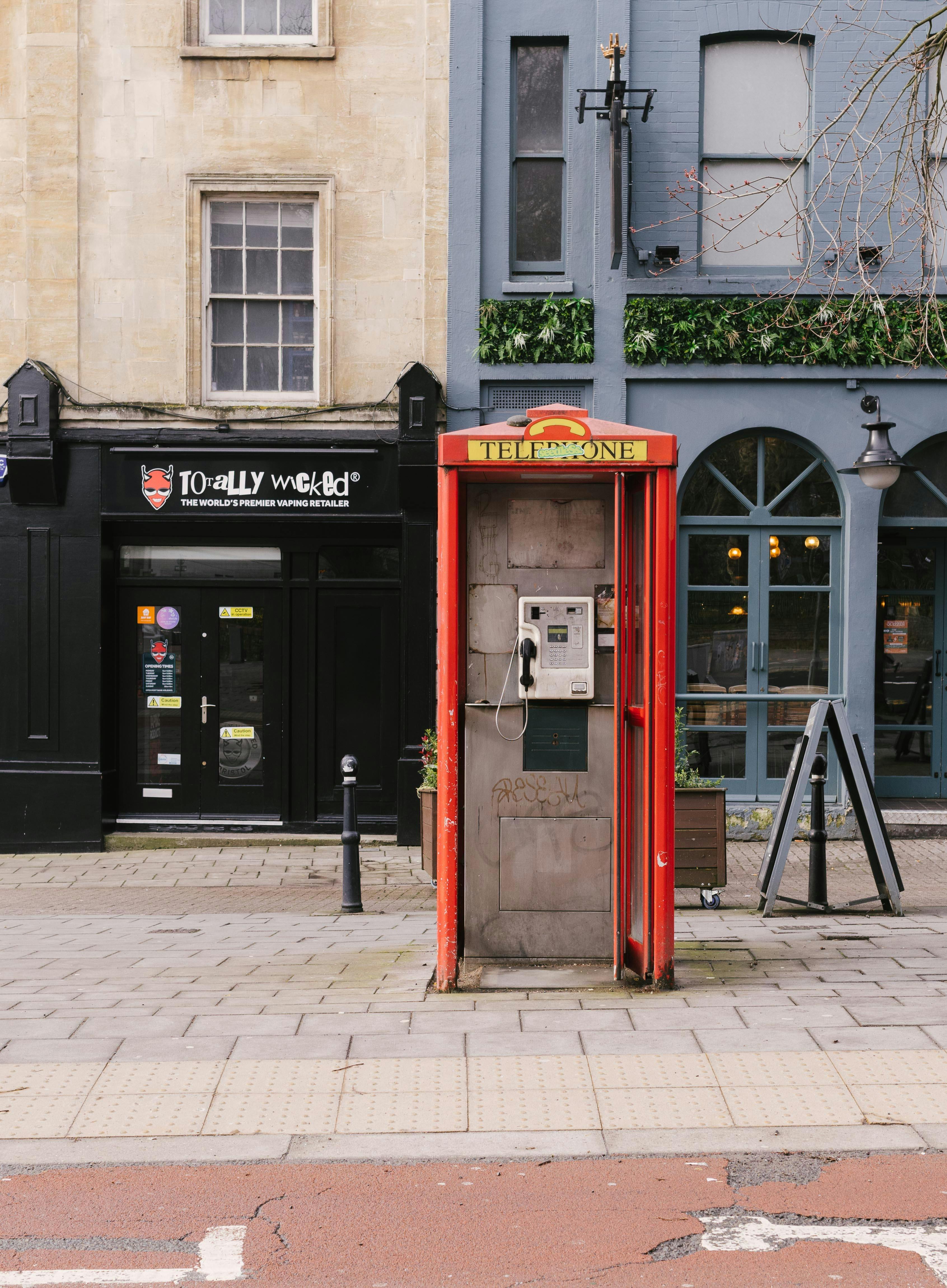 Red Phone Boots by Rural House · Free Stock Photo