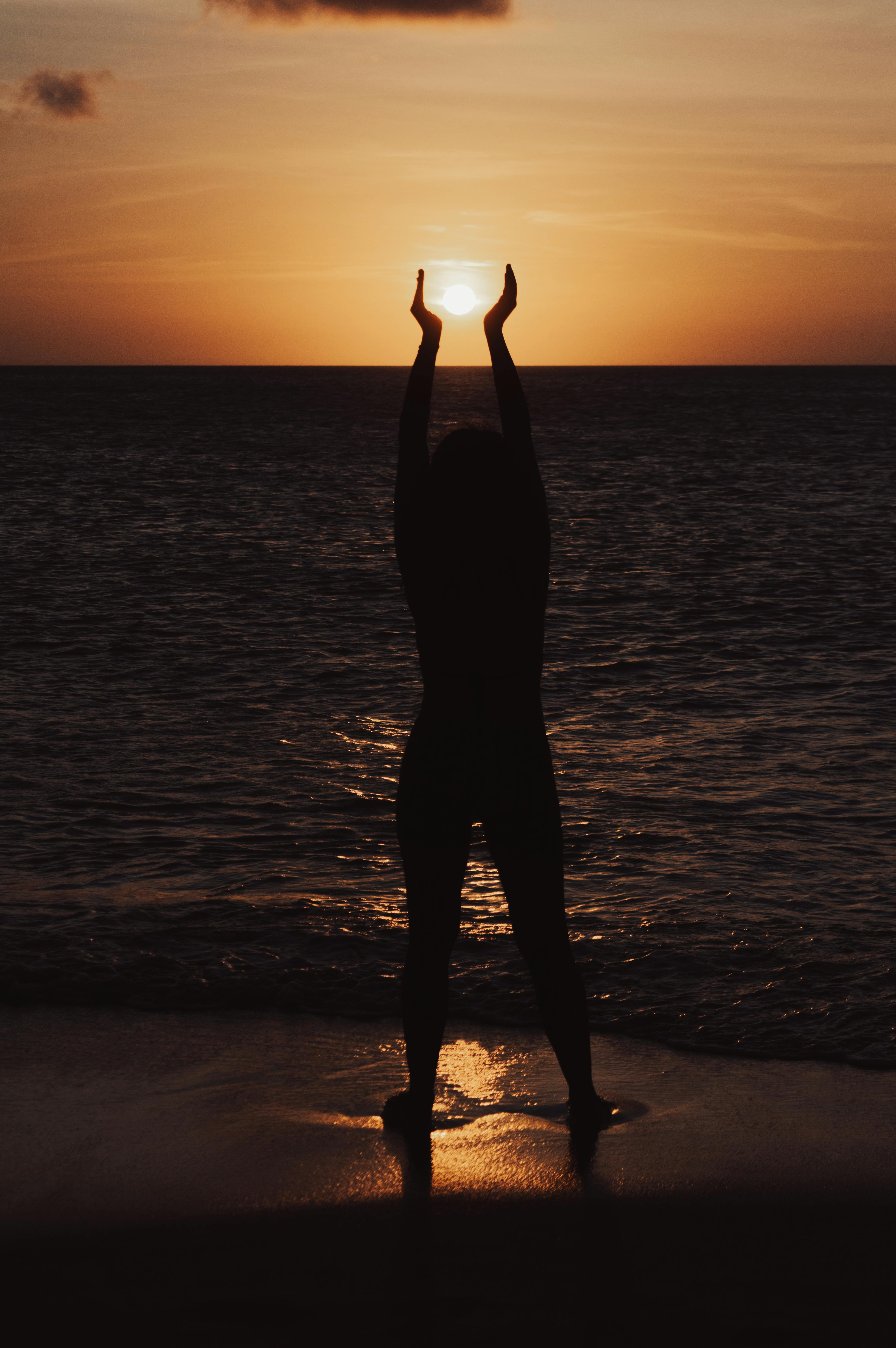 Person Touching Sun · Free Stock Photo