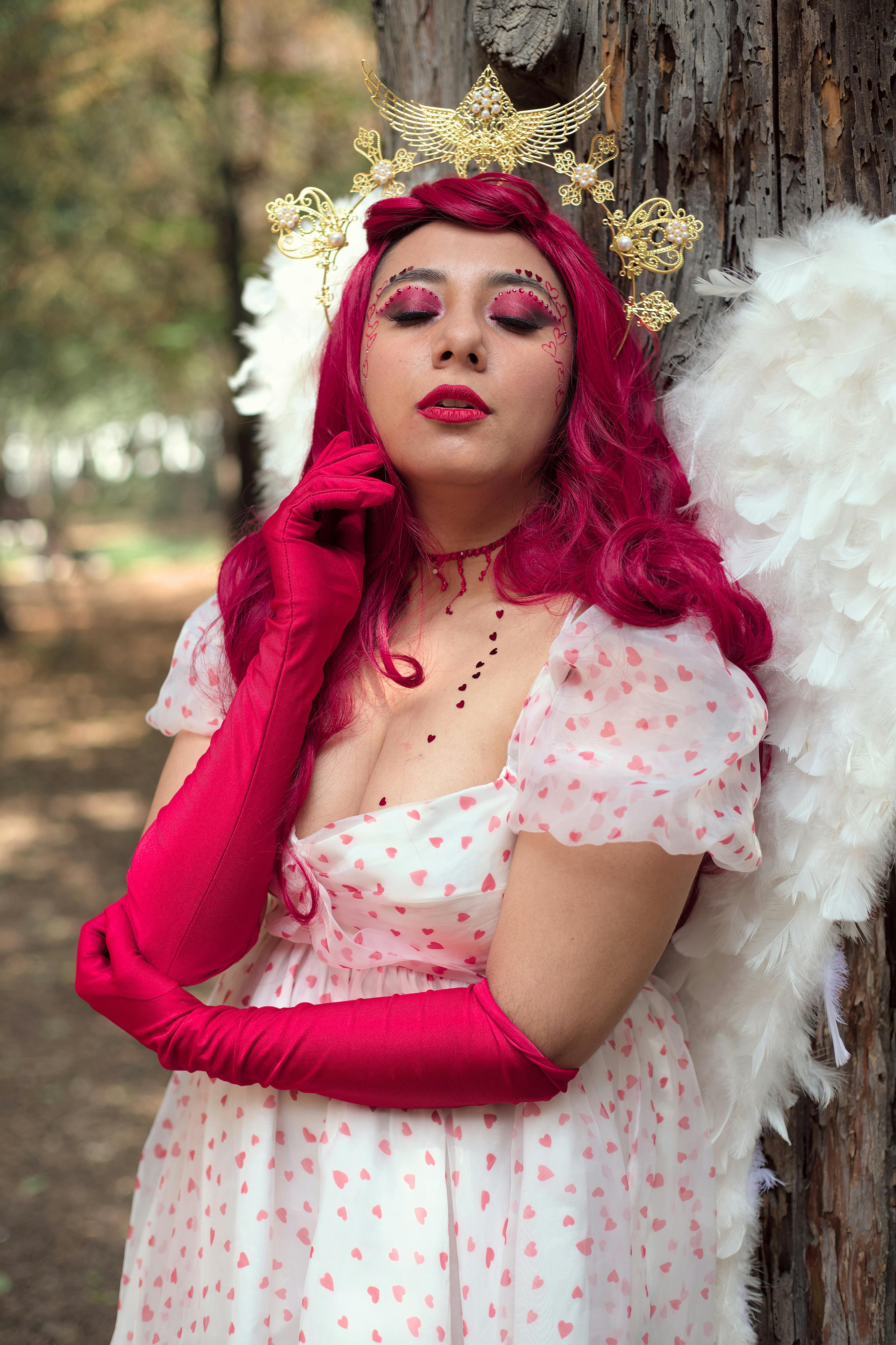 A Woman Posing in an Angel Costume · Free Stock Photo