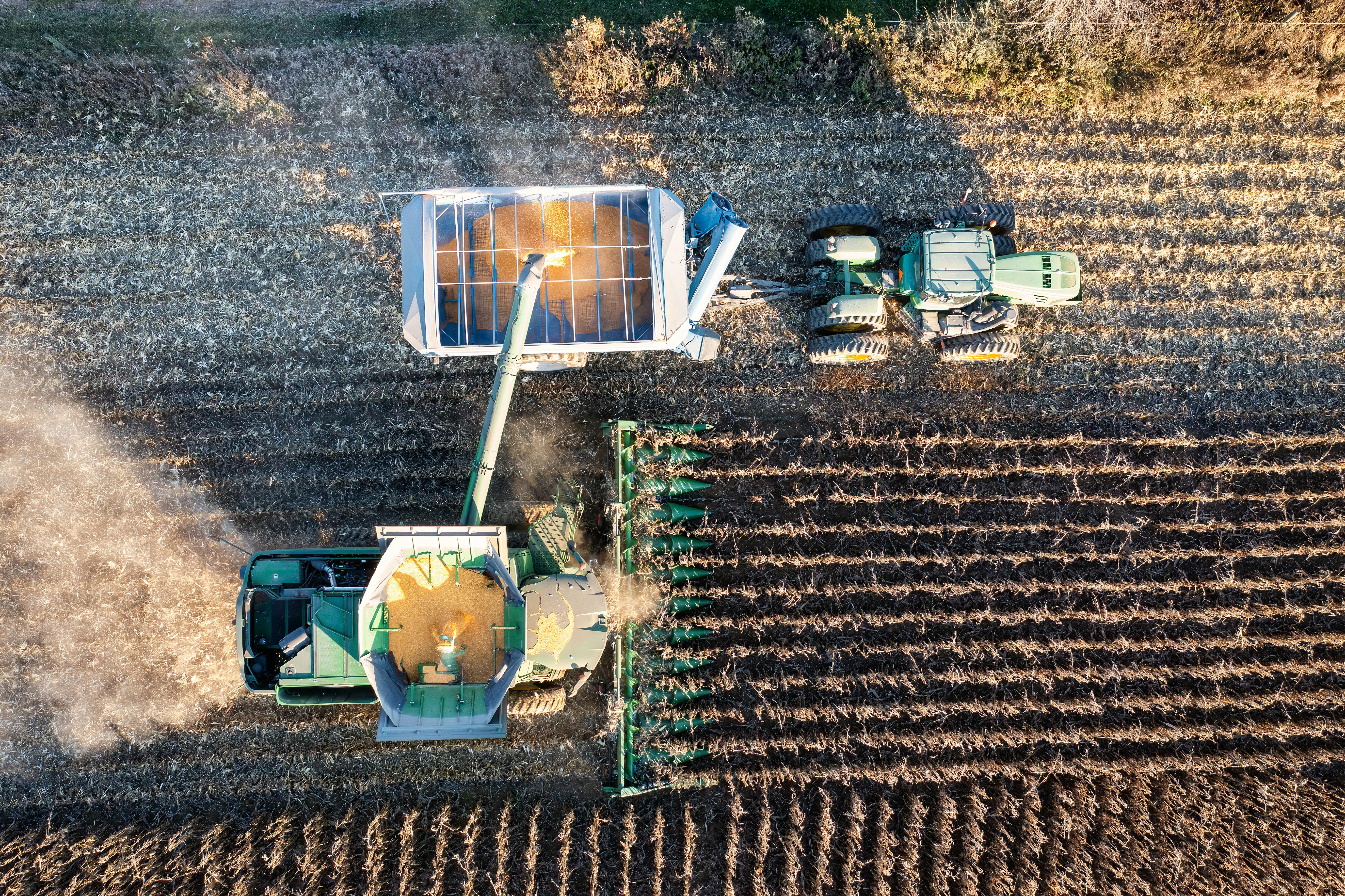 Tractors on a Field Seen From Above · Free Stock Photo