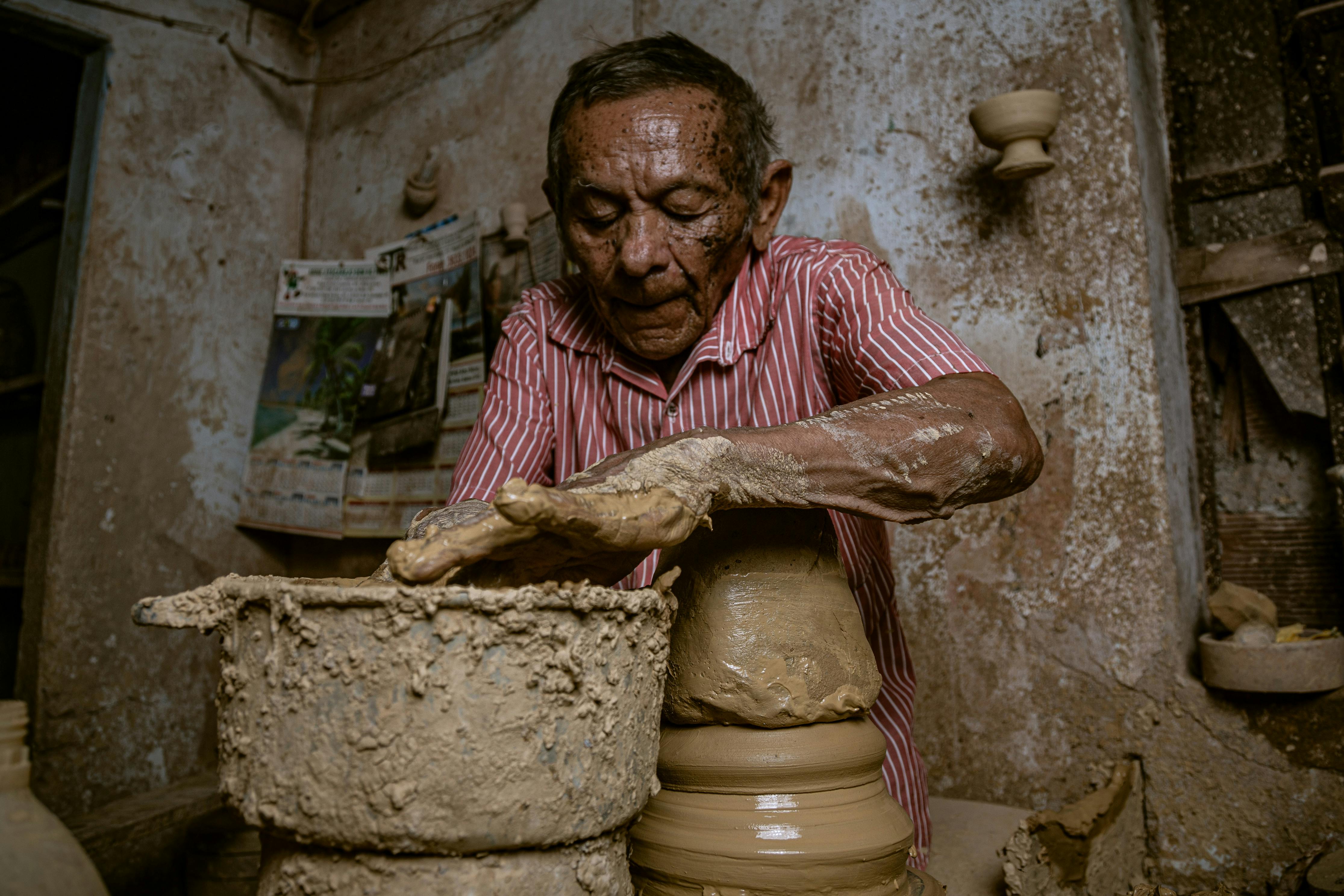 Elderly Man Making Pots · Free Stock Photo