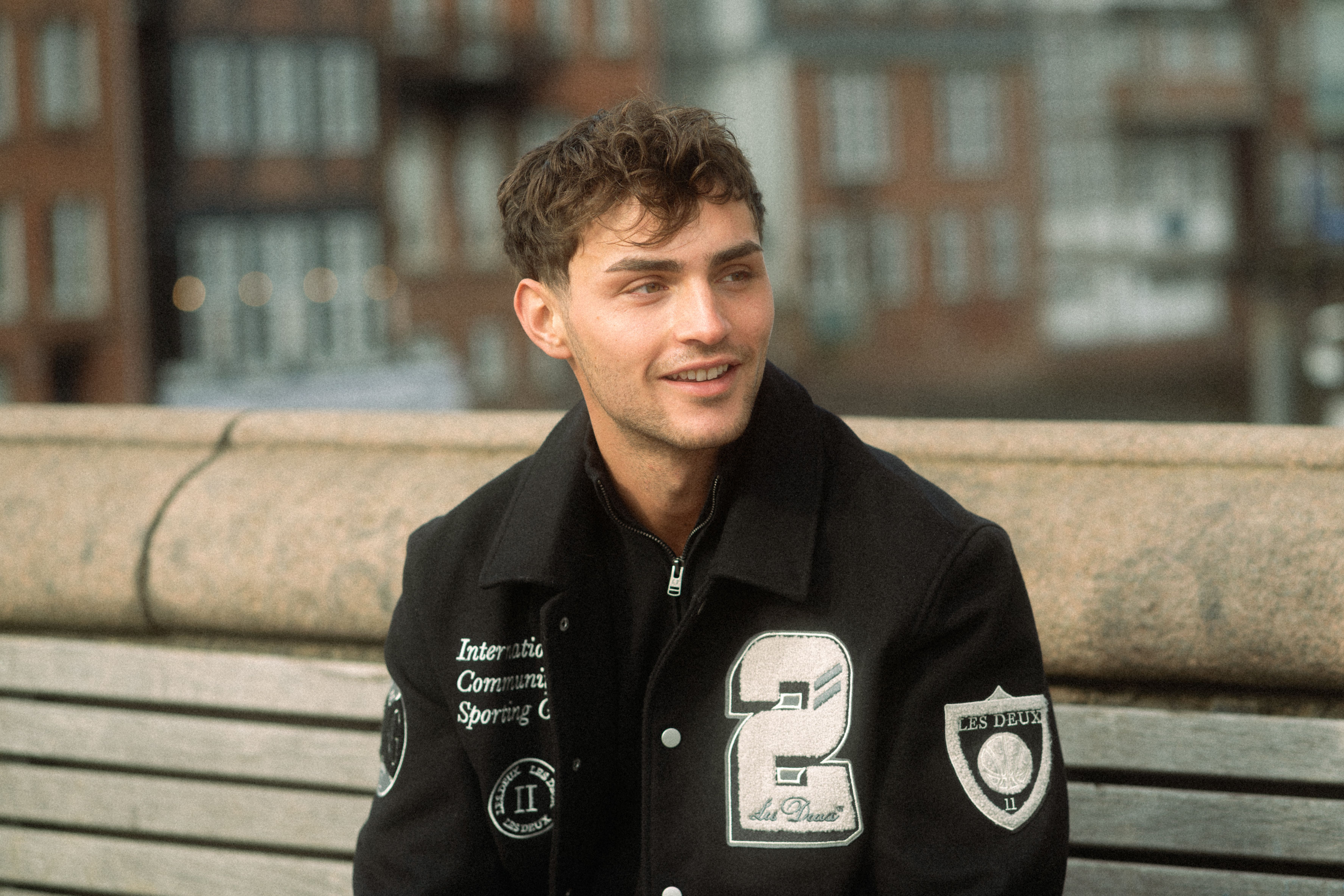 Smiling Model in Jacket · Free Stock Photo
