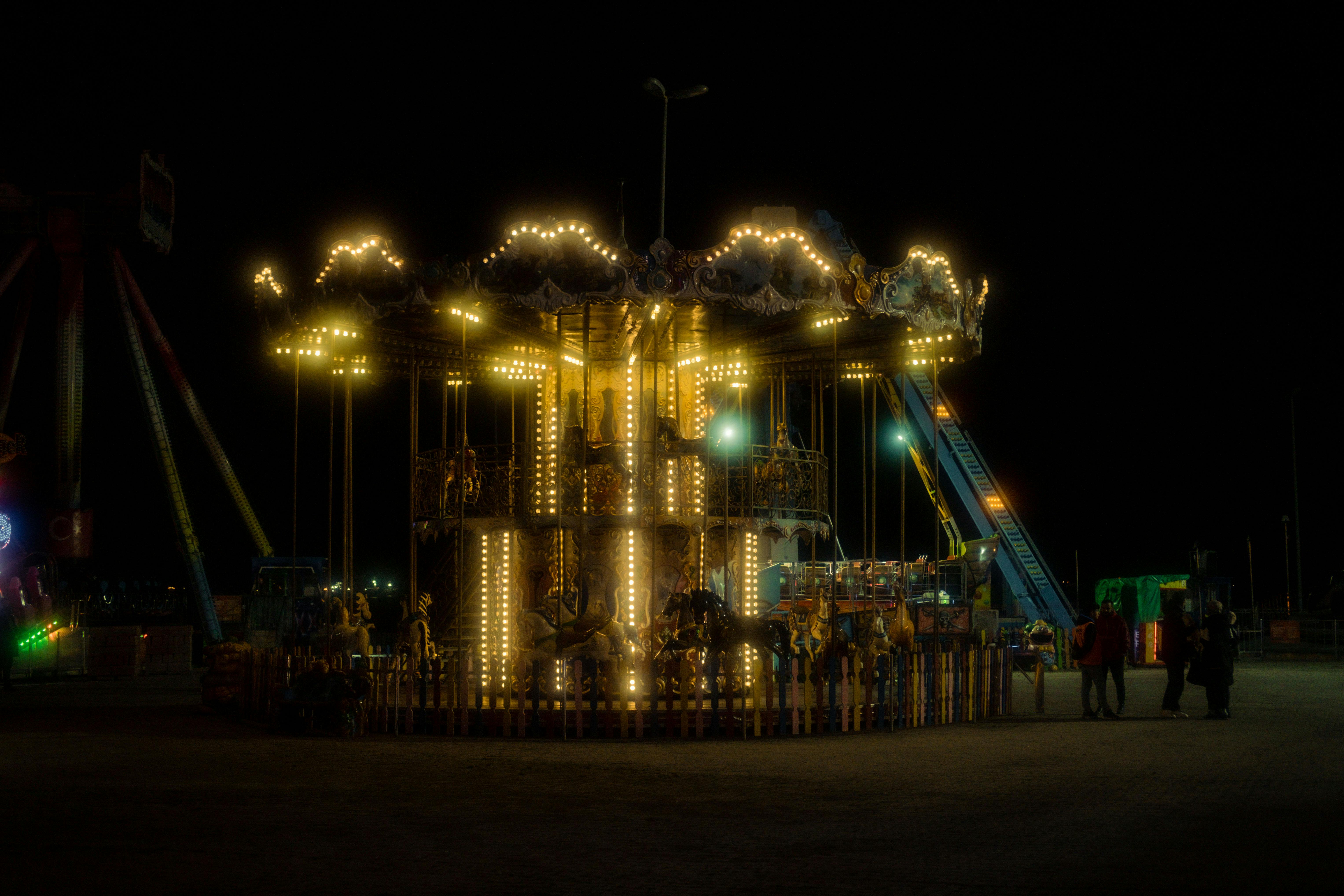 Illuminated Carousel at Night · Free Stock Photo